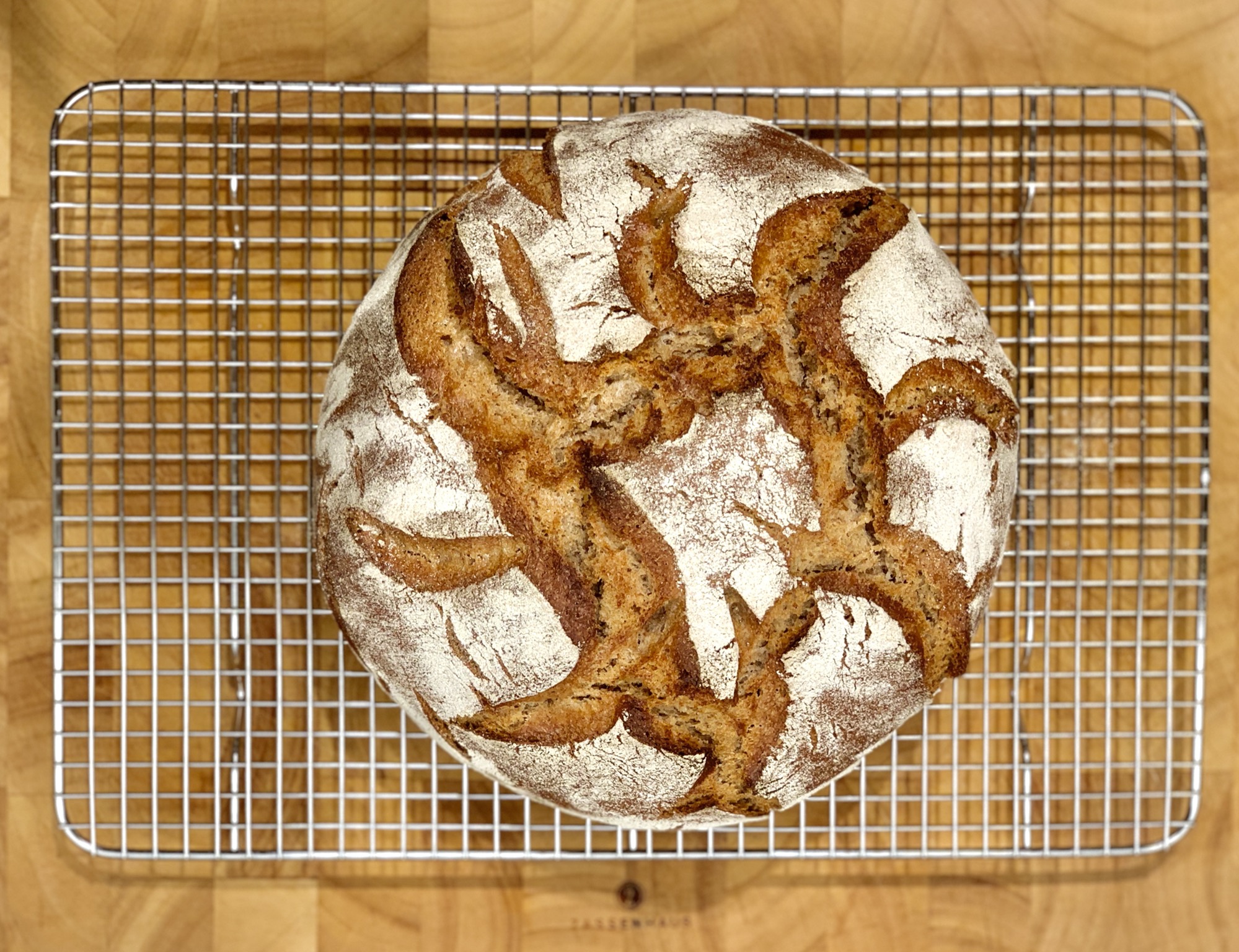 First time making sourdough bread. Whole grain rye, spelt and wheat. | Scrolller