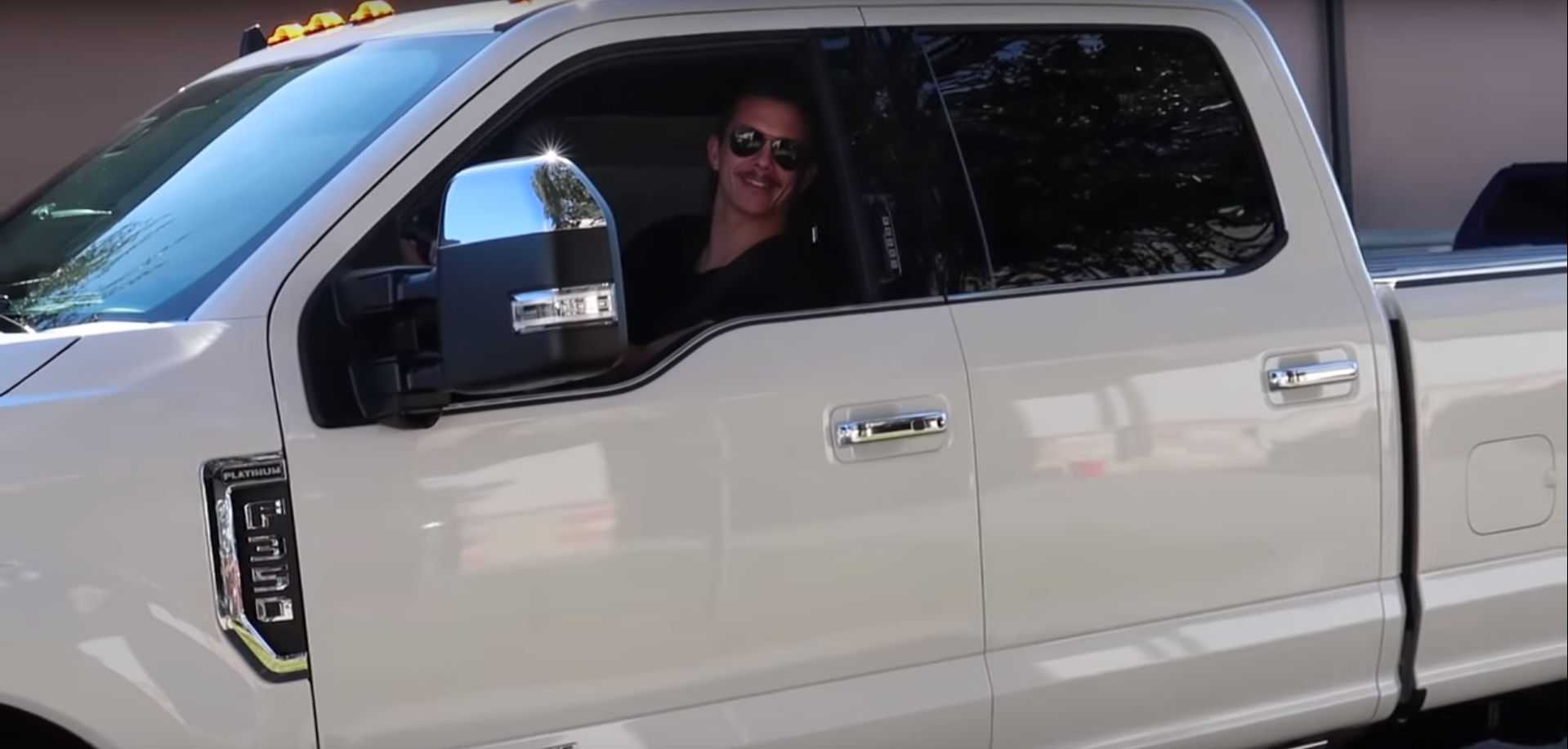 Florida man showing off how good his new truck looks with his mustache. | Scrolller
