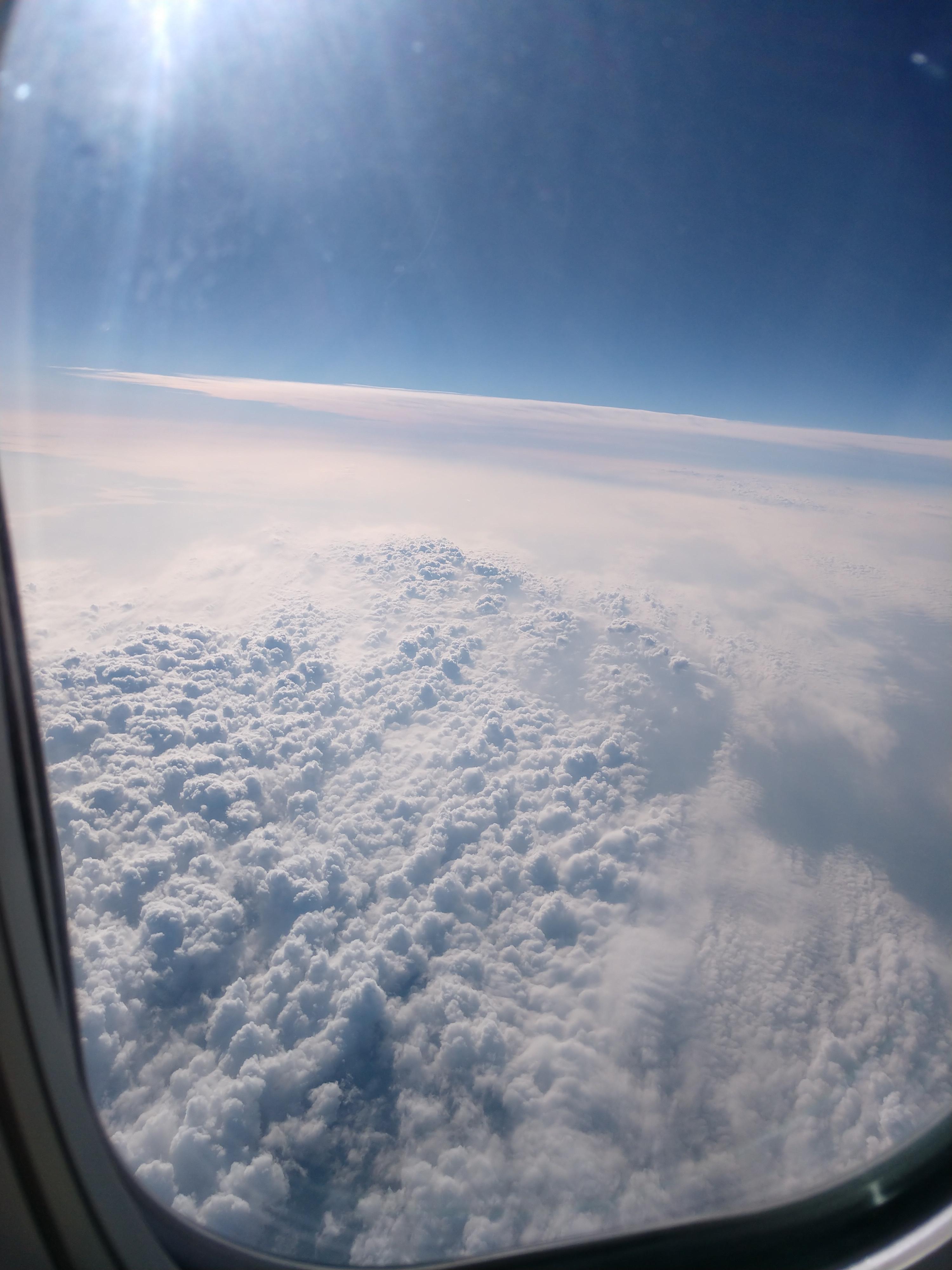 Flying above clouds looks like this | Scrolller