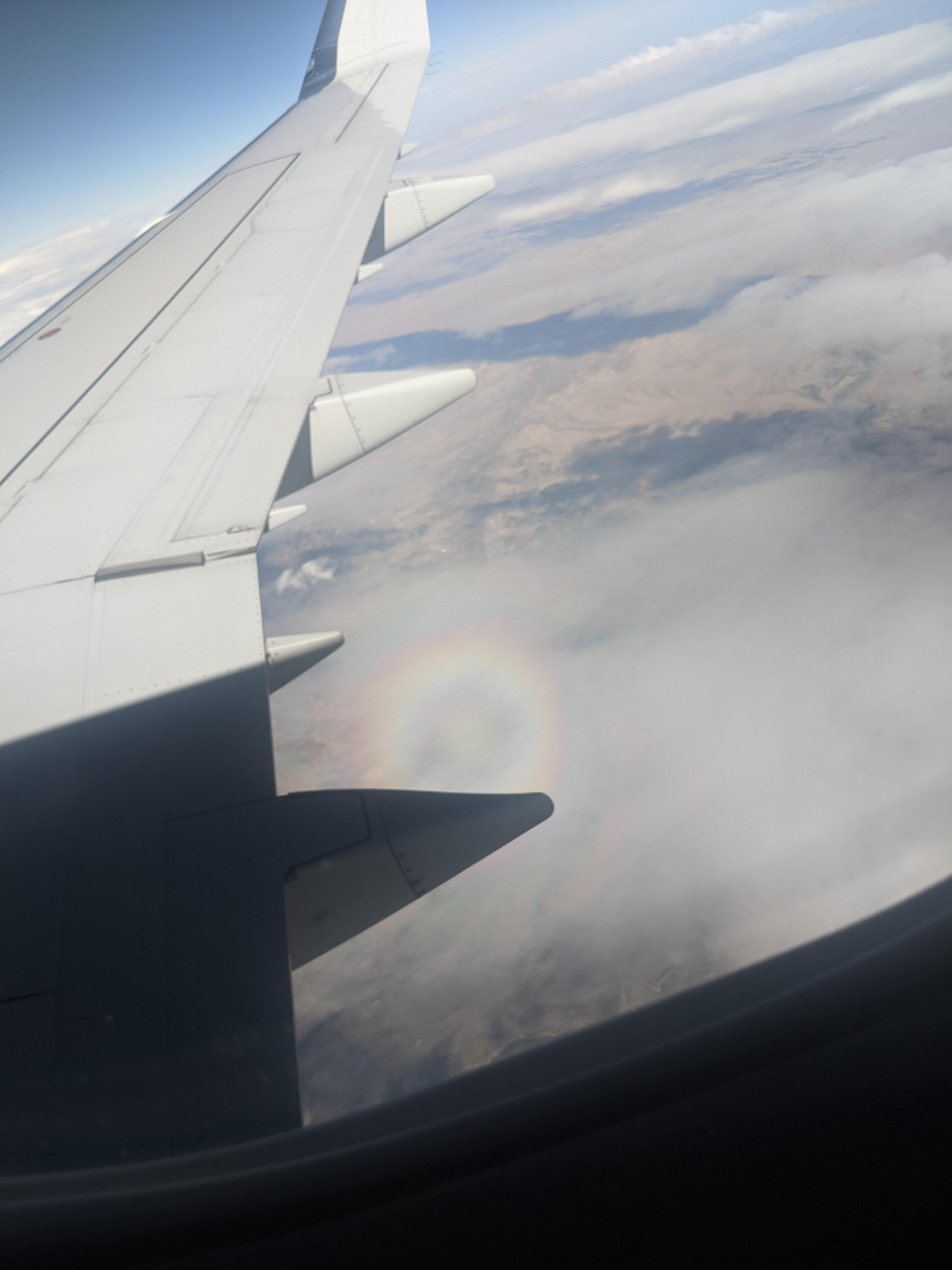 Full rainbow above the clouds | Scrolller