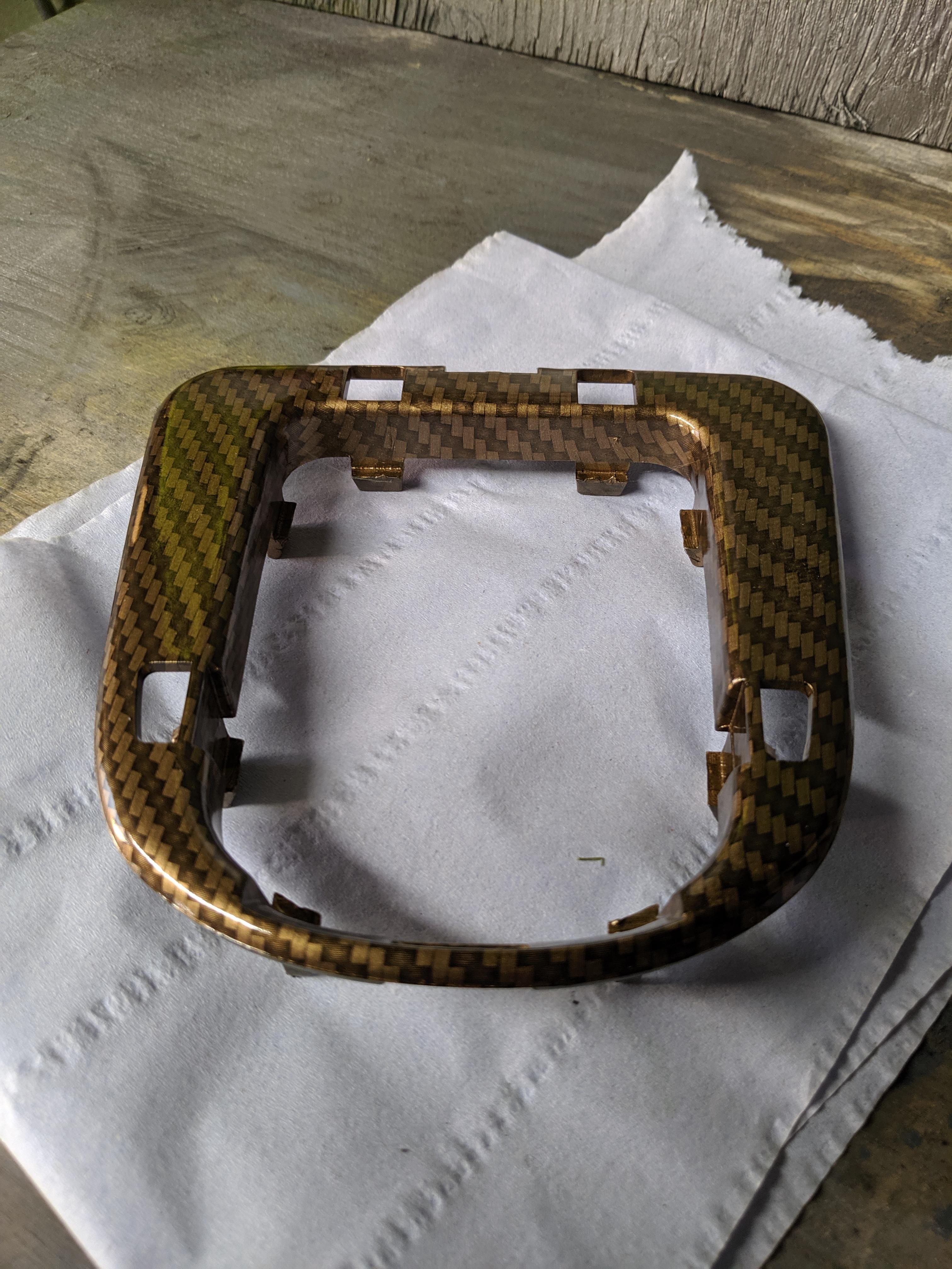 Gold base coat with black carbon weave | Scrolller