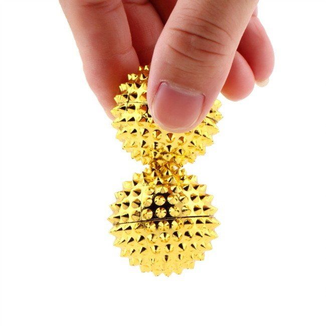 Golden spiky balls of magnetic fidget fun. | Scrolller
