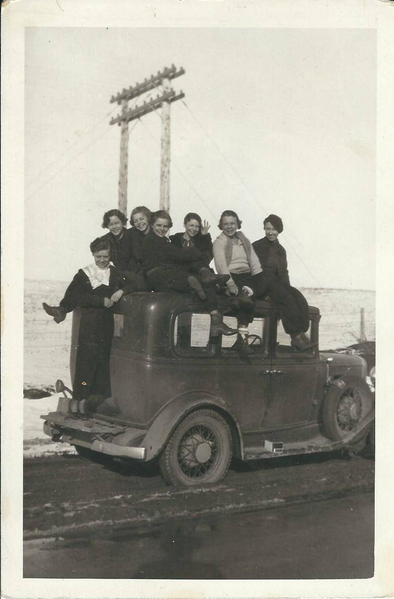 Grandma (middle) and her Six Sisters, Going for a Ride - Eau Claire, WI 1934 | Scrolller