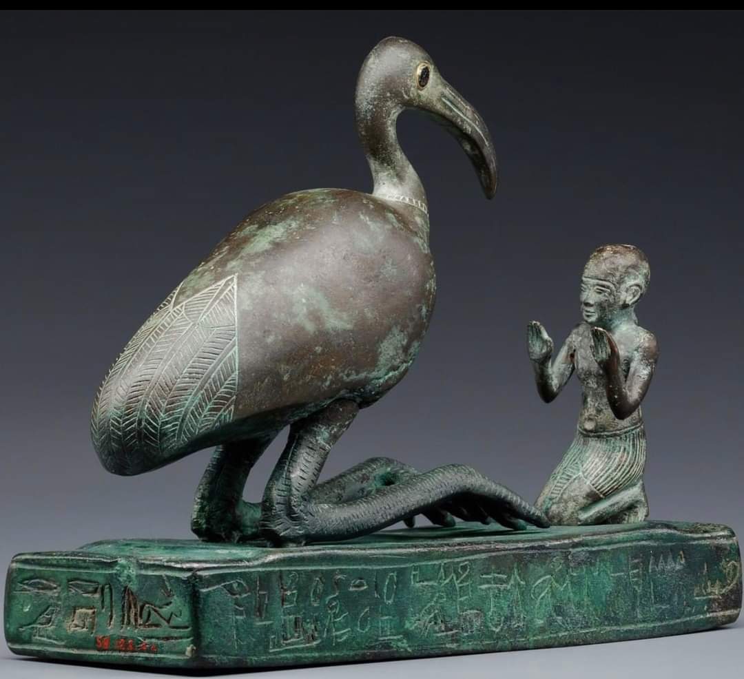 Group statue of Thoth-ibis and devotee on a base inscribed for Padihorsiese. (1080x986) | Scrolller