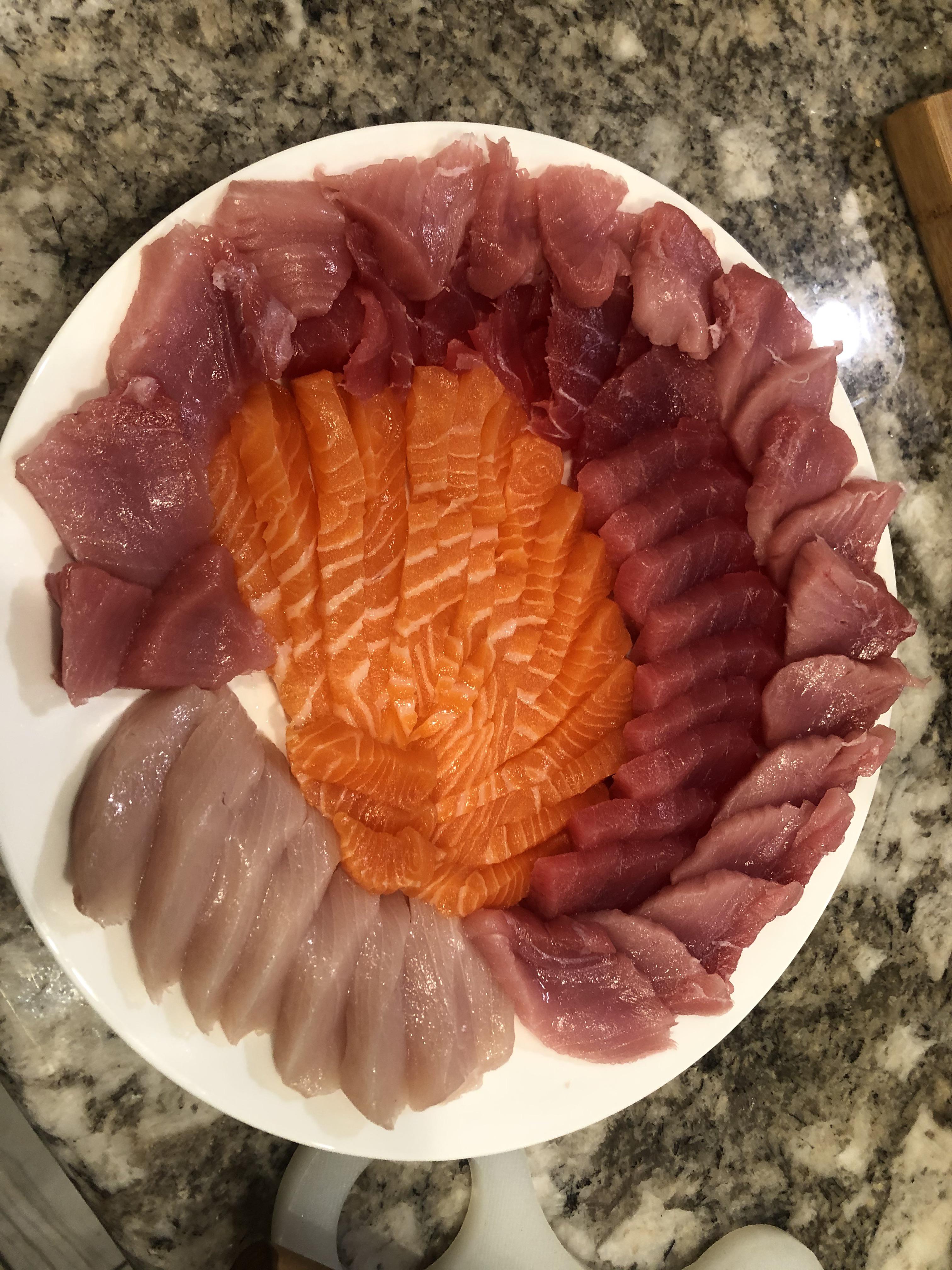 Hand-sliced sashimi for chirashi bowls | Scrolller