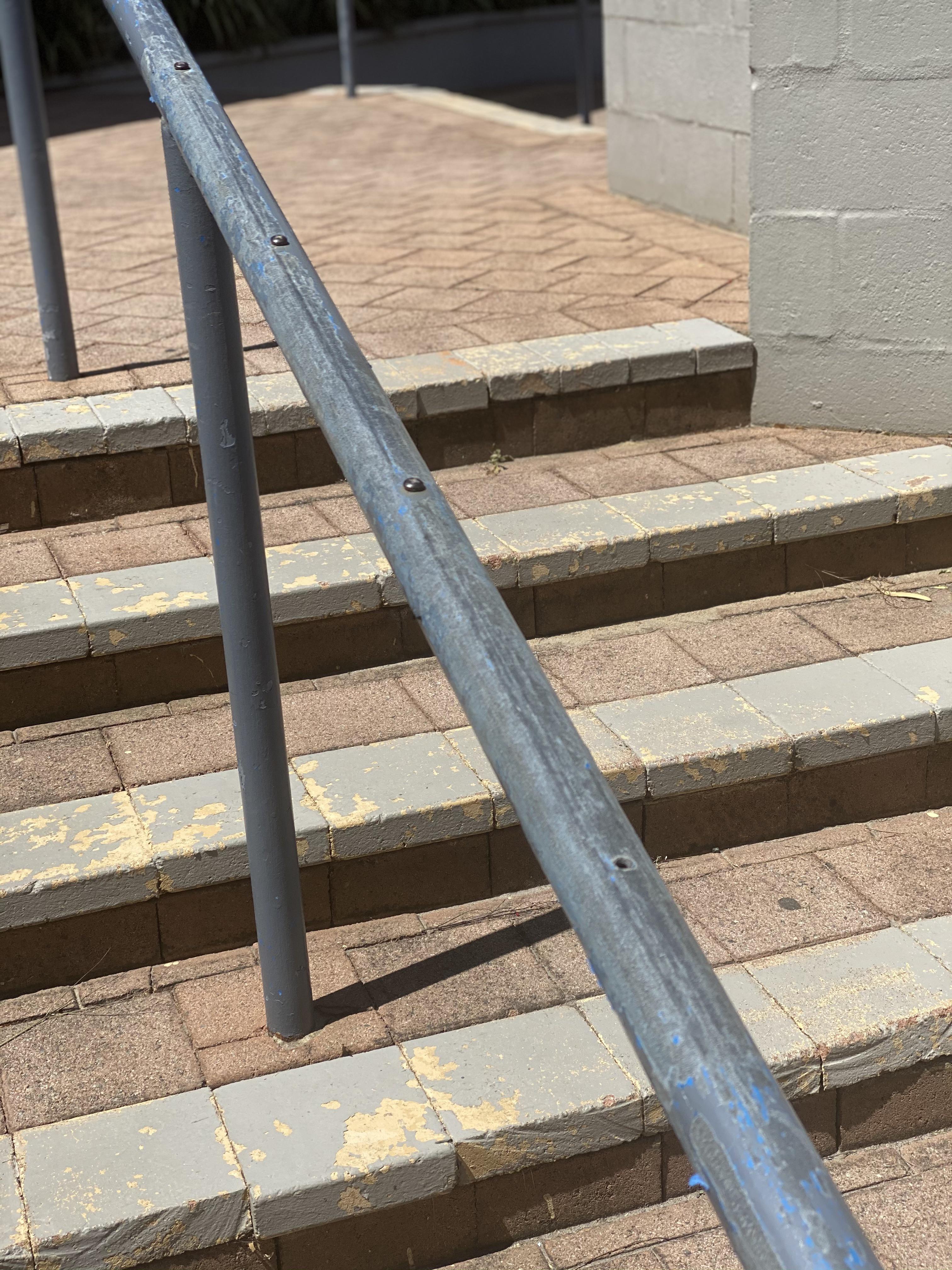 Handrails with screws installed to prevent sliding/skateboards. | Scrolller
