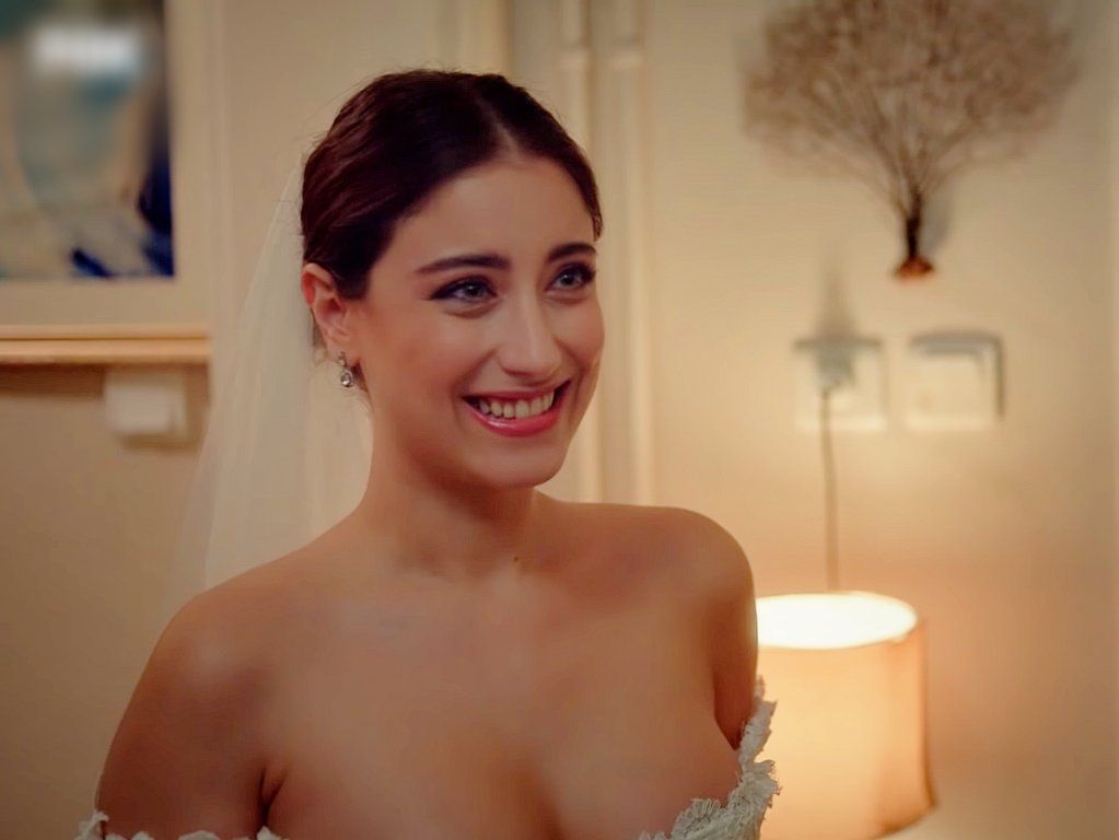 Hazal Kaya smiling | Scrolller