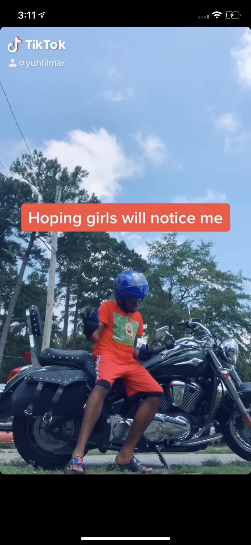 He hopes girls will notice him on his motorcycle when he’s wearing a ...