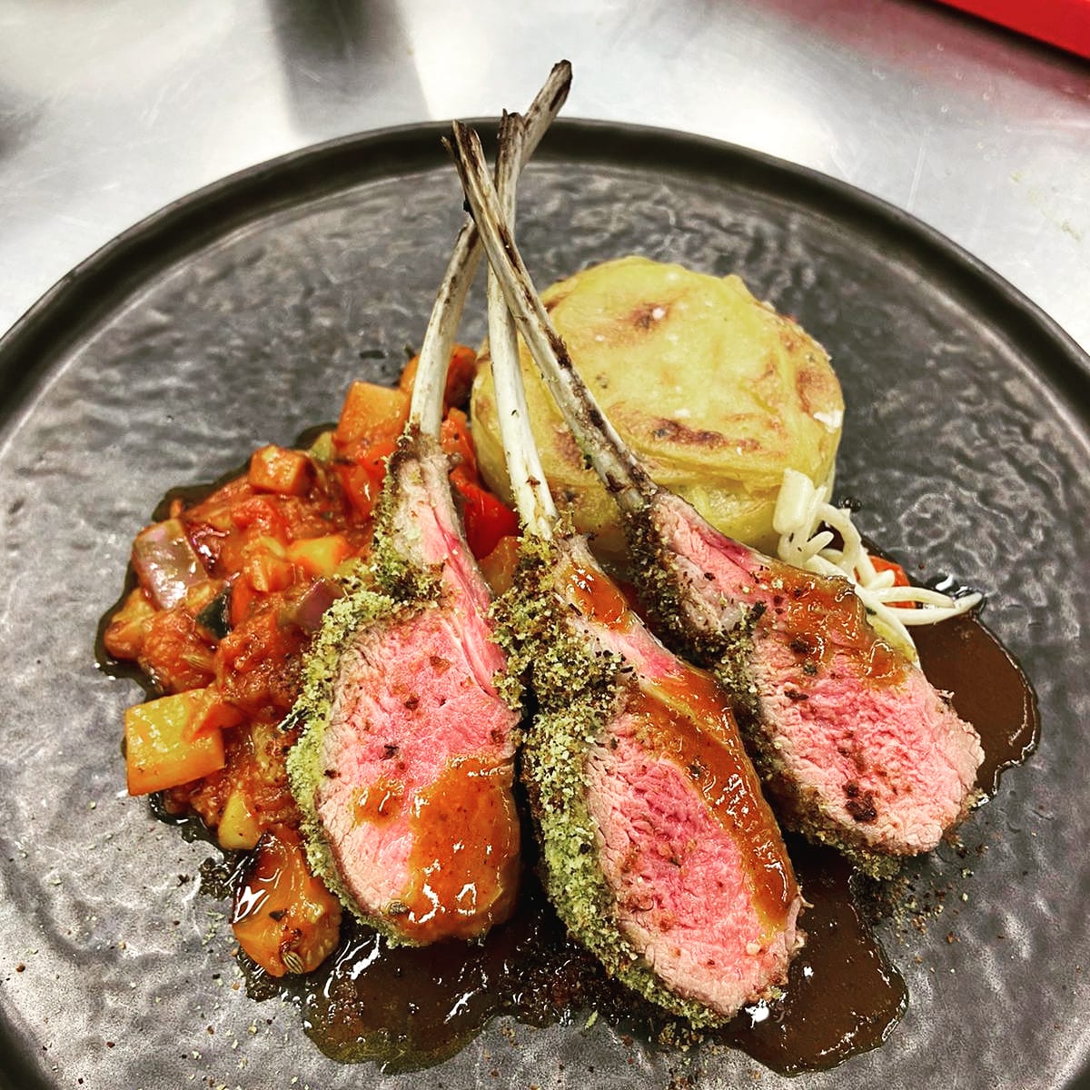 Herb crusted lamb chops with lamb demi glace on ratatouille and potato gratin [homemade] | Scrolller