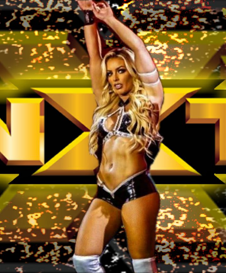 Here is another pic of Mandy Rose in front of the NXT logo! | Scrolller
