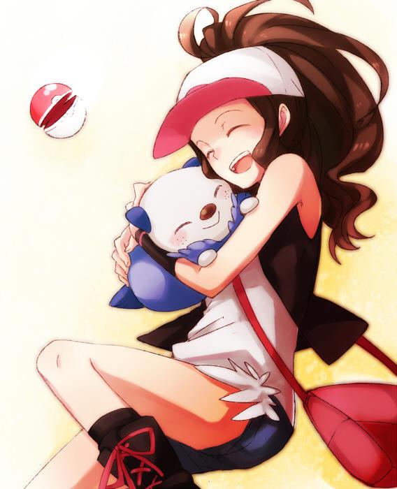 Hilda hugging her Oshawott | Scrolller