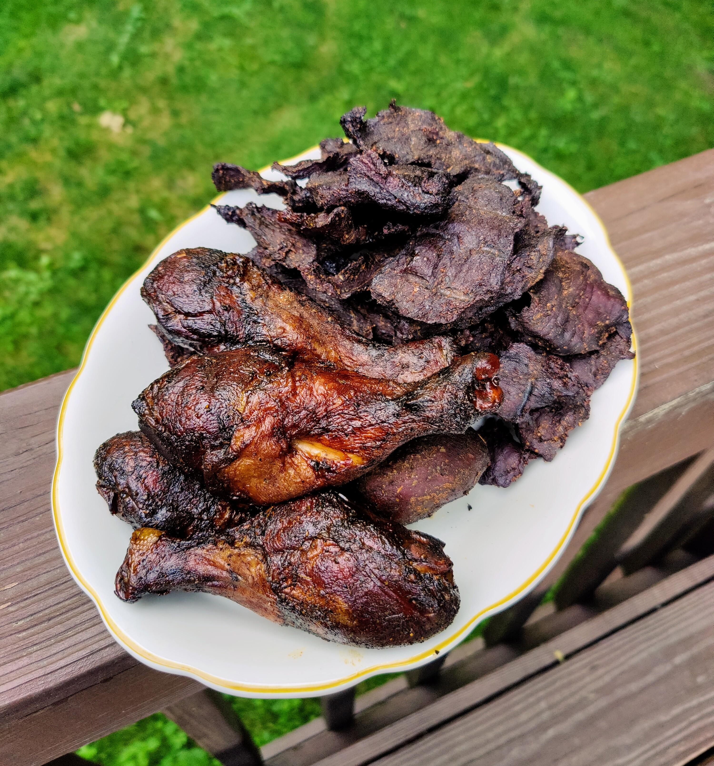 Homemade cracked pepper and garlic smoked venison jerky and chicken drumsticks | Scrolller