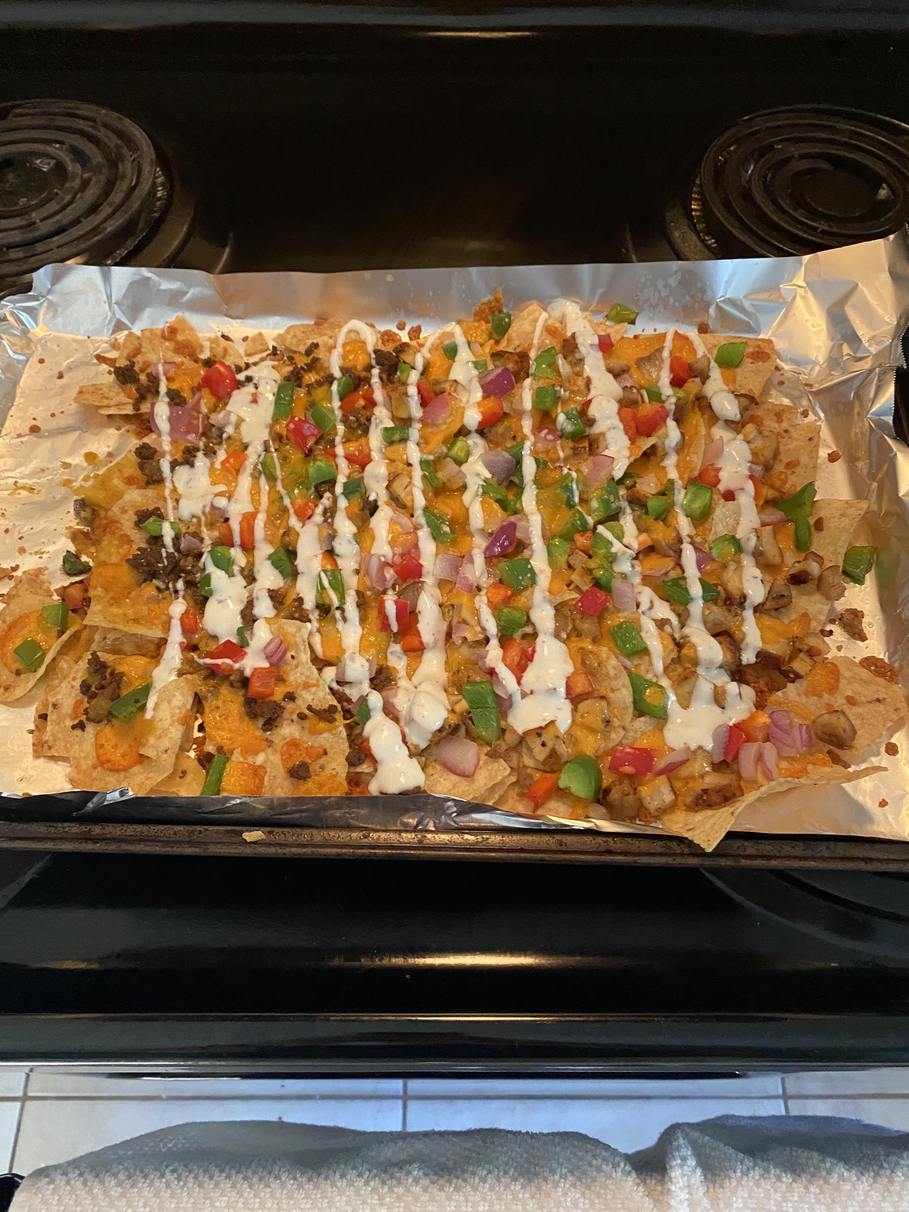 [Homemade] Nachos. Left side beef, right side chicken. | Scrolller