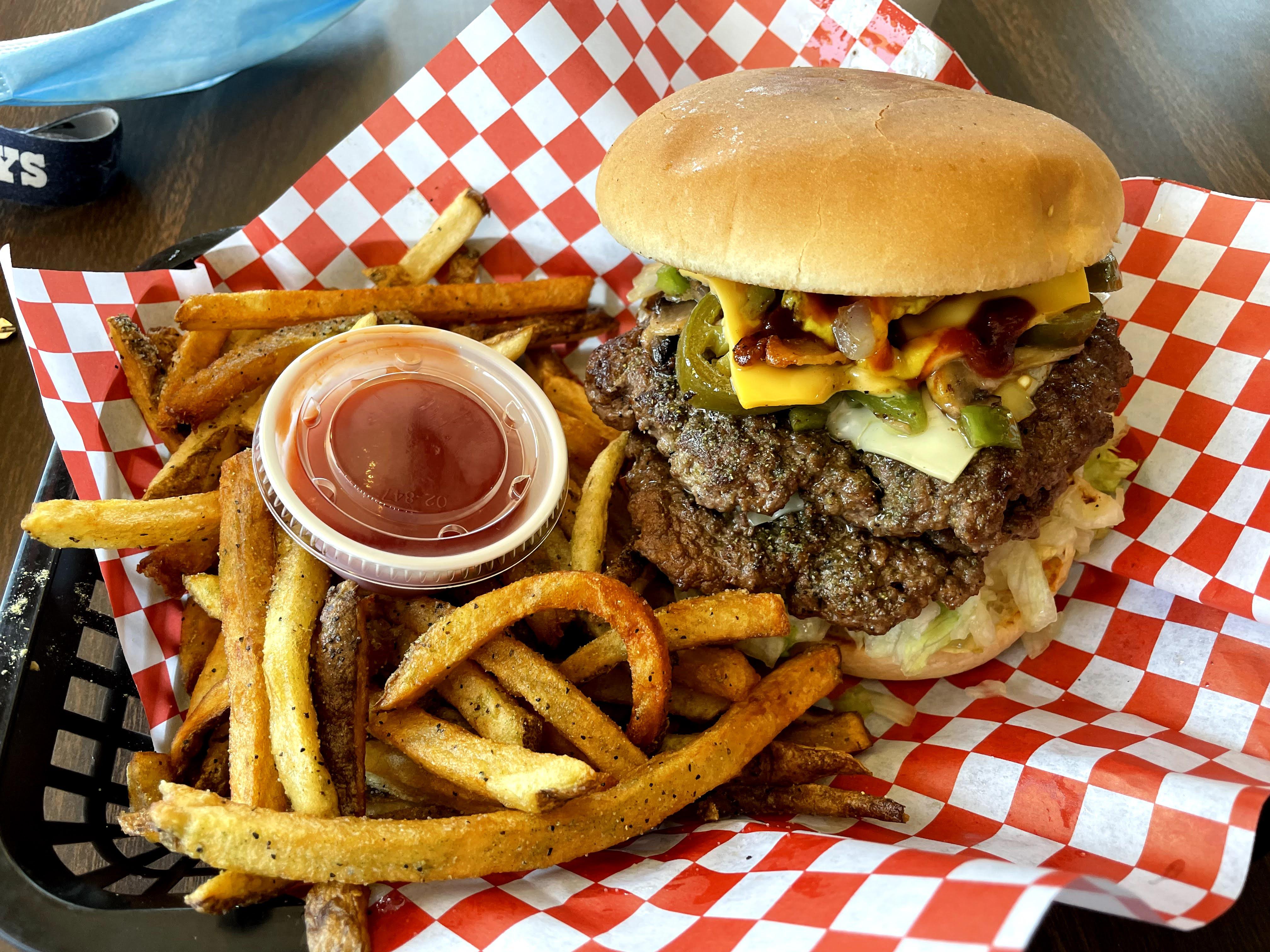 I couldn't finish it all but it was damn tasty. Danny's Big Burger Arlington TX. Double Rowdy ...