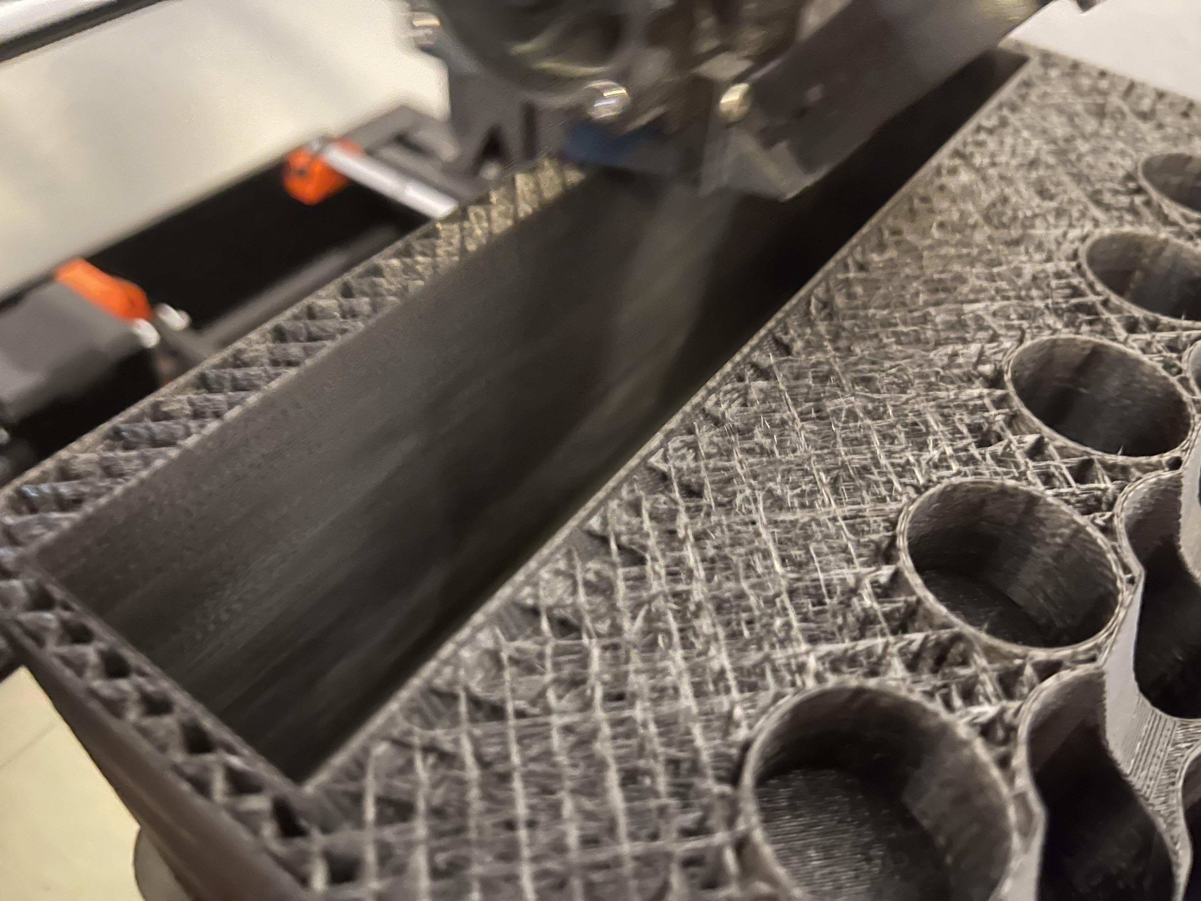 Is it under extrusion, wet filament or something else? | Scrolller