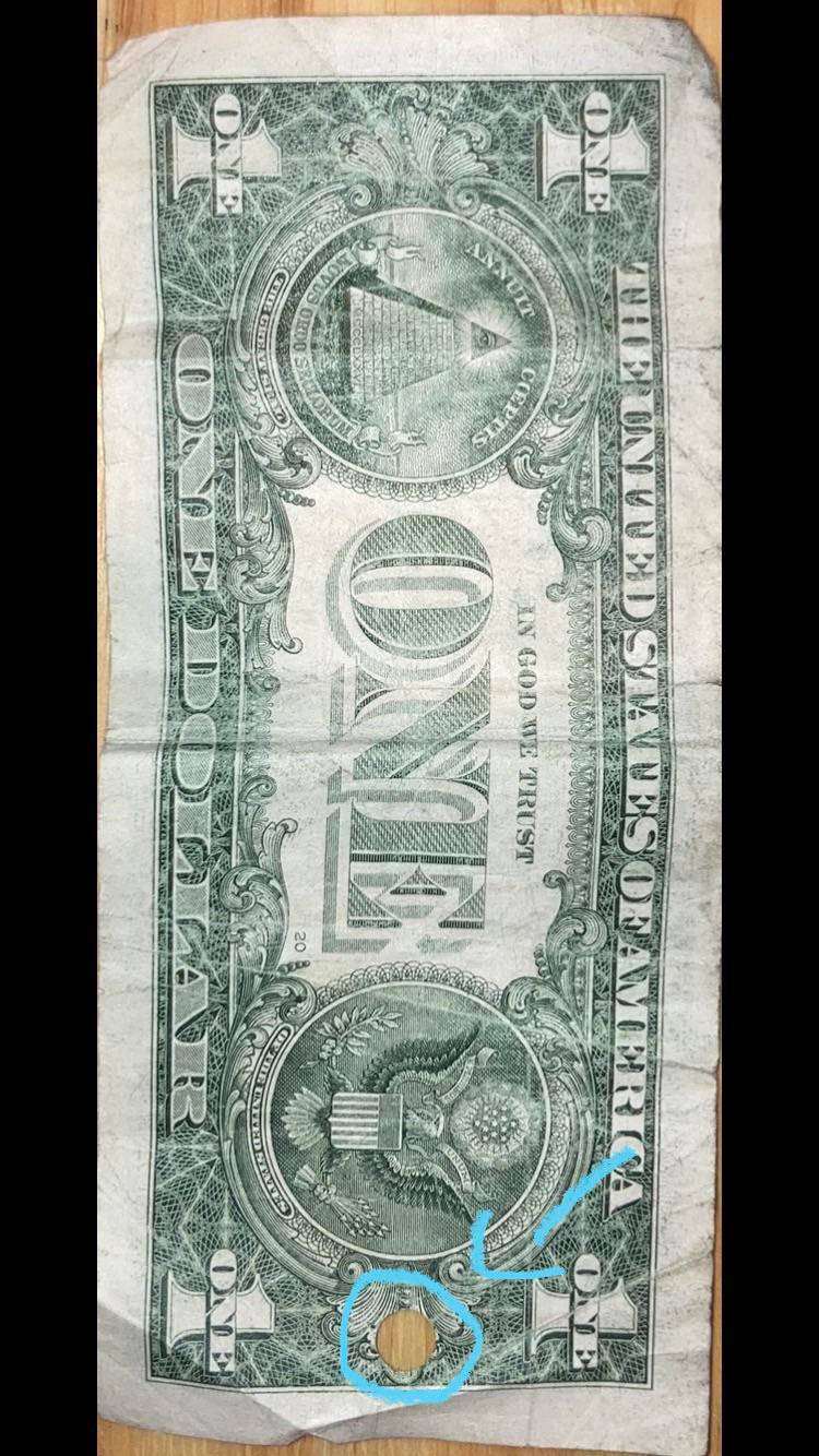 Is my dollar hole punched? | Scrolller