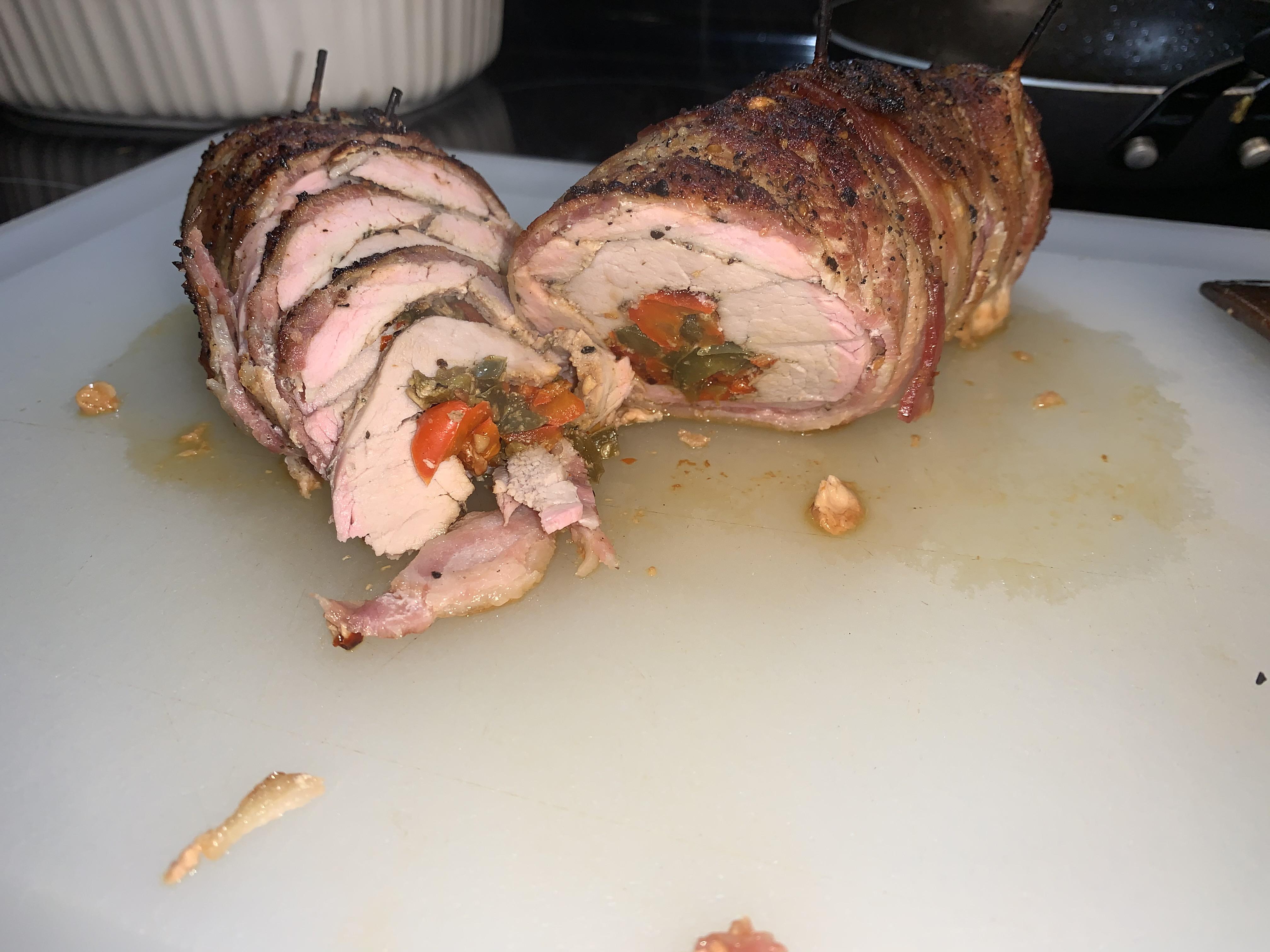 Jalapeño and red bell pepper stuffed, bacon wrapped pork tenderloin | Scrolller