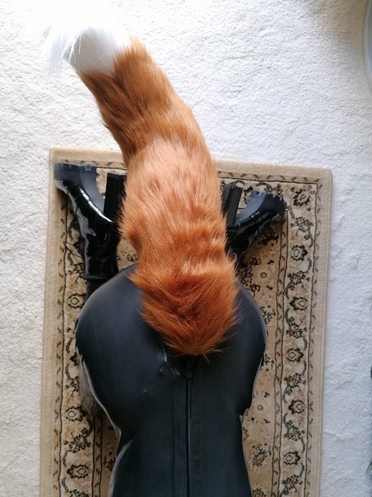 Latex covered tail wags