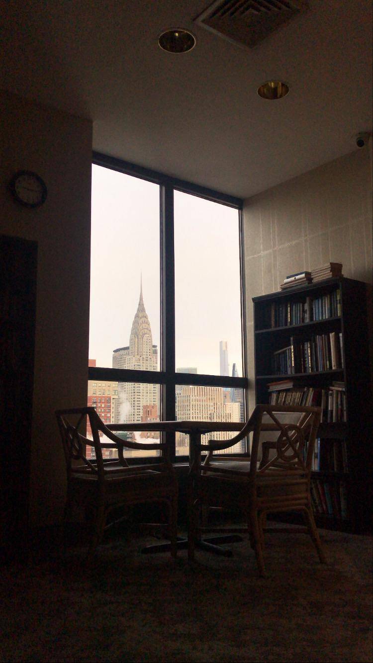 Library in my apartment building where I take online classes from. | Scrolller