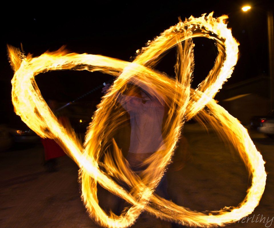 Light painting with a fire staff! photo credit: Eric Herlihy | Scrolller