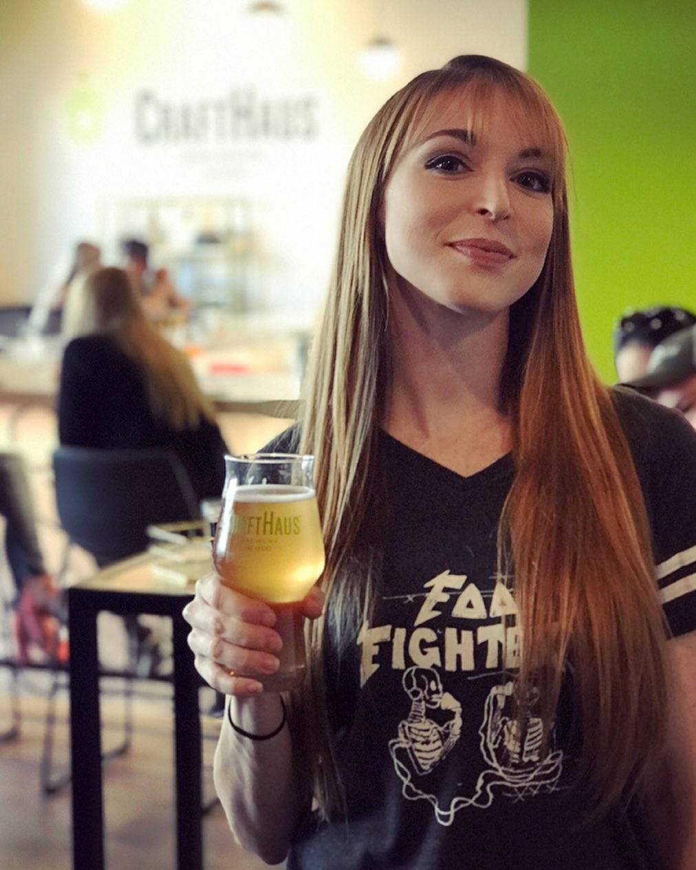 Lisa Foiles enjoying a beer from CraftHaus Brewery | Scrolller
