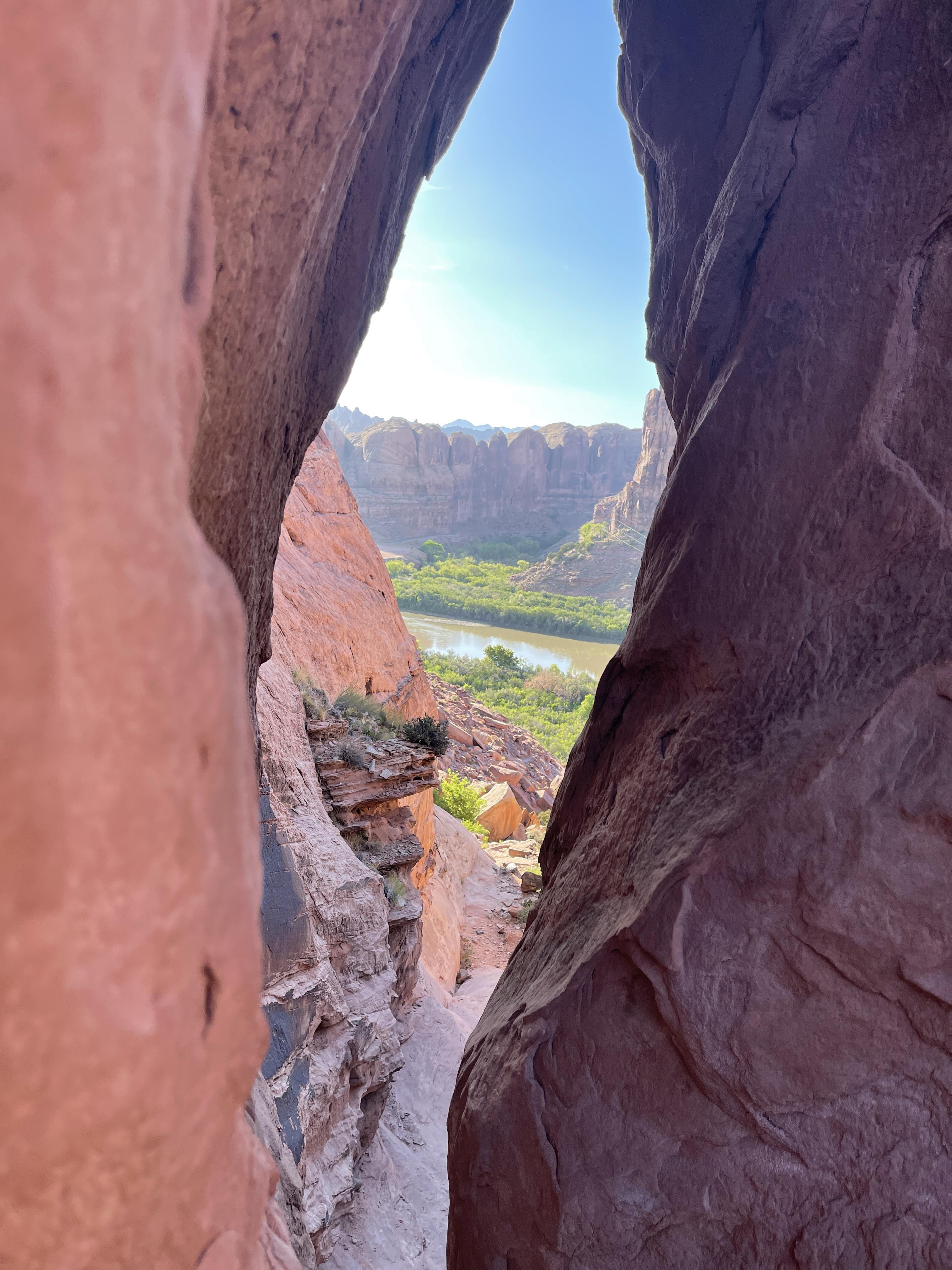 Looking through a crevice in Moab, Utah | Scrolller