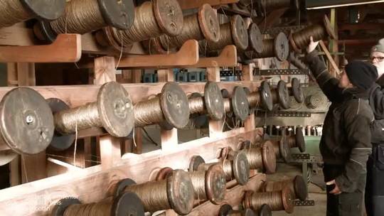 Making a four-strand rope out of tarred hemp for rigging a historic ship | Scrolller