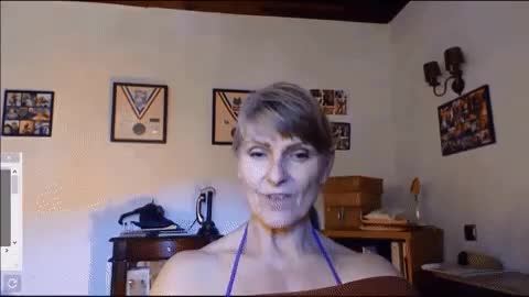 Massive Mature Muscle Lady Flexes Powerful Biceps | Scrolller