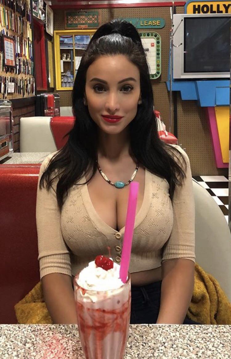 Massive milkshakes next to a smaller milkshake | Scrolller