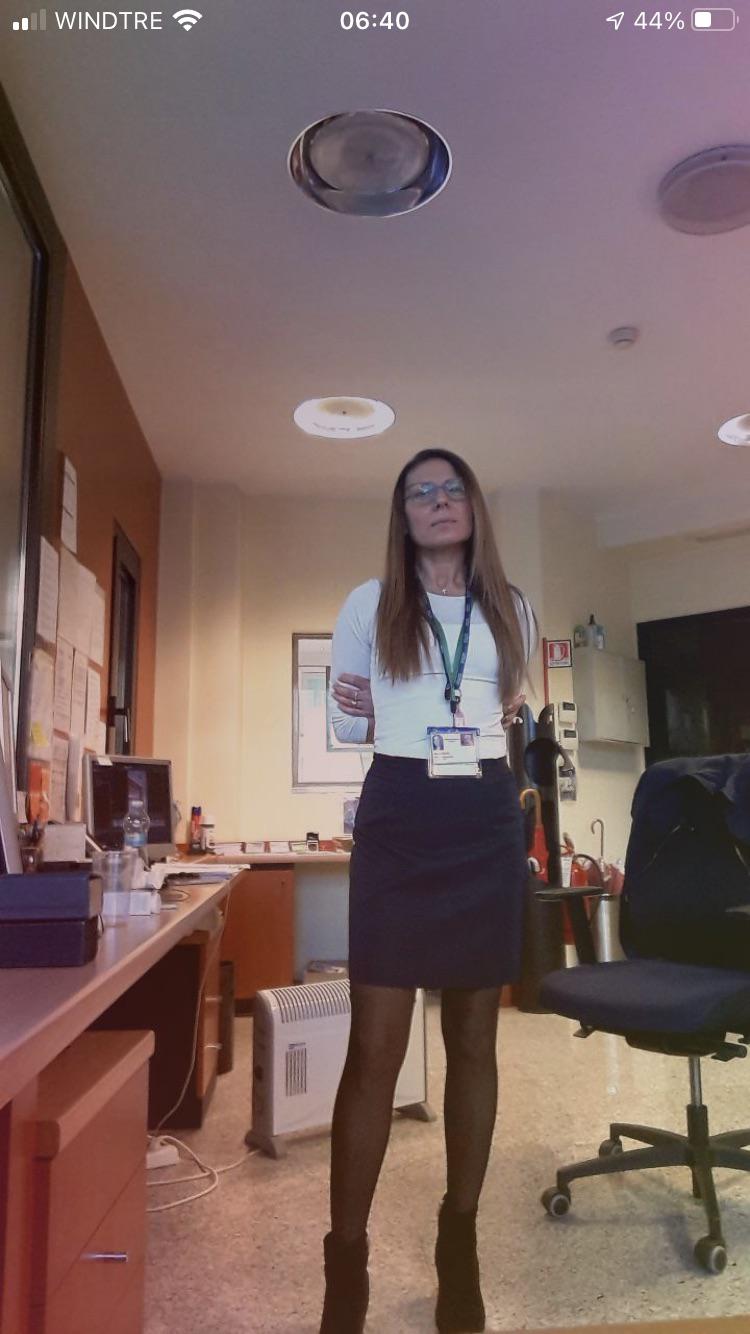 Mature woman. Arms crossed behind back | Scrolller