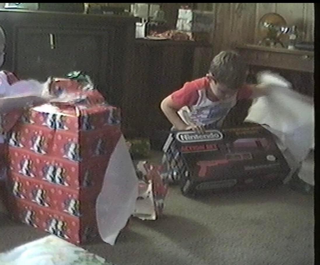 Me ripping into my NES Christmas 1989. | Scrolller