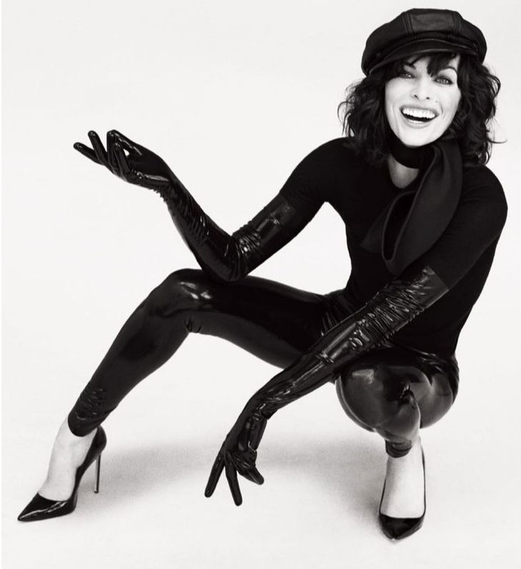 Milla Jovovich - latex leggings and gloves | Scrolller