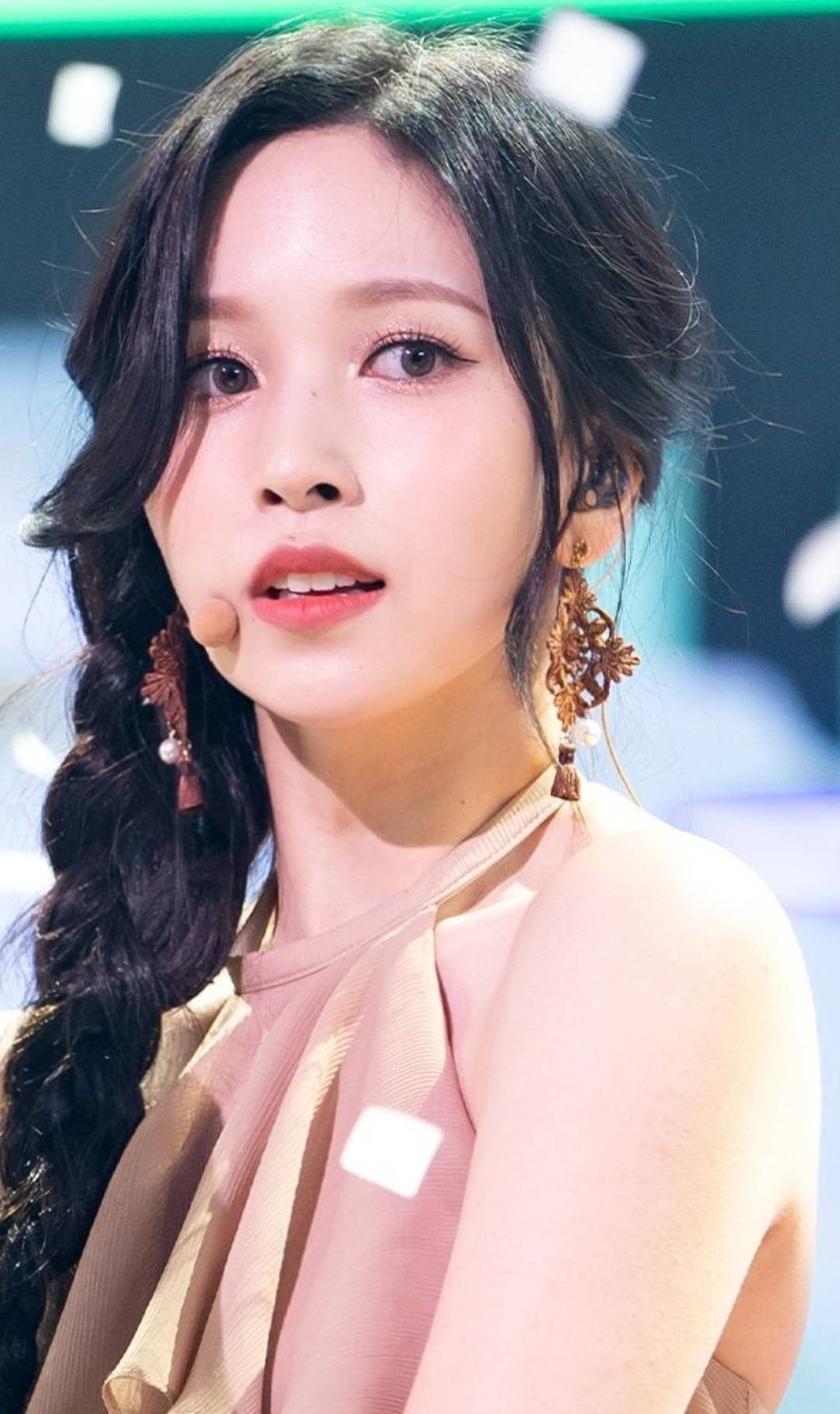 Mina - close up, braided ponytail, beige alcohol free dress | Scrolller