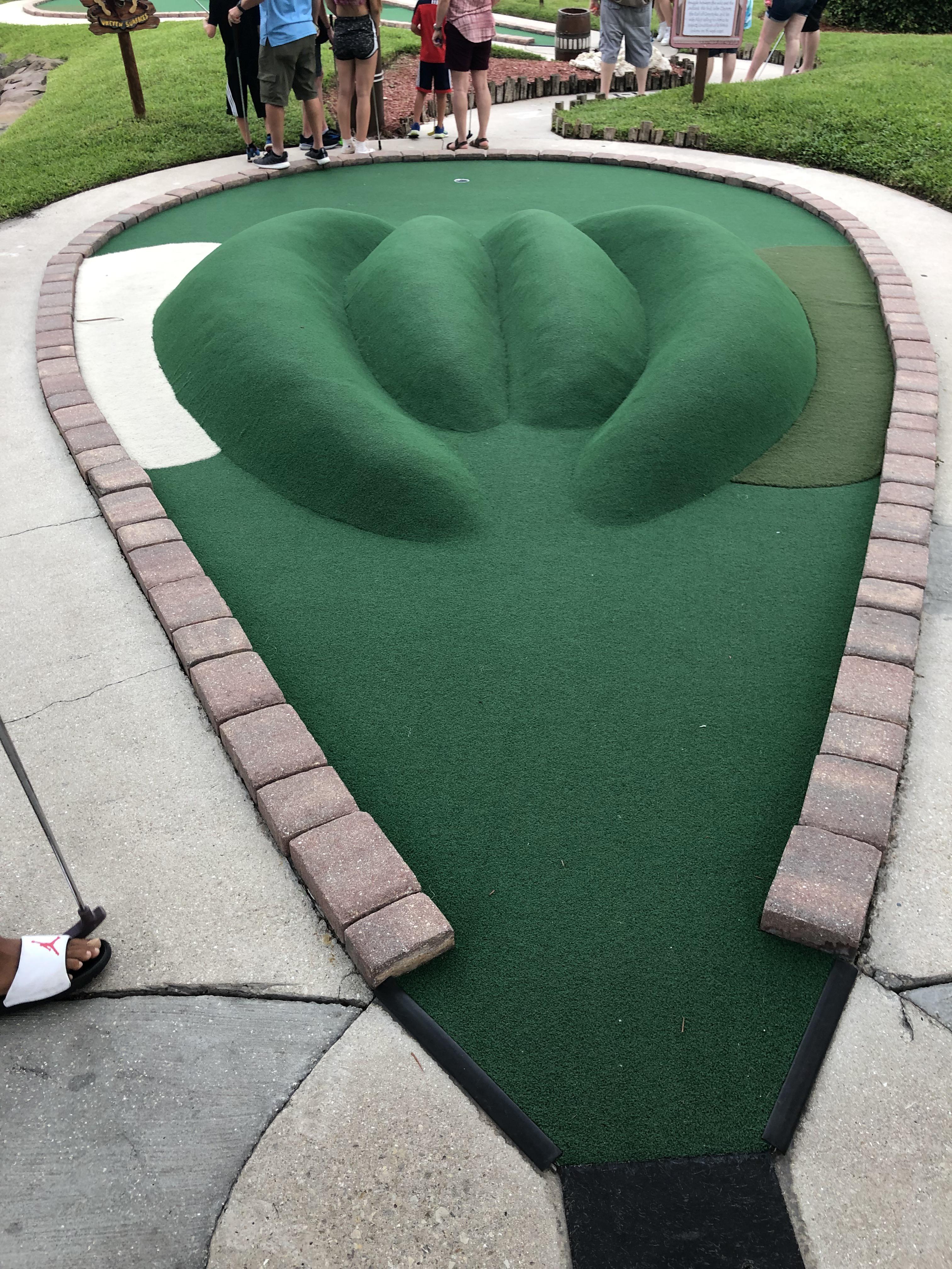 Mini golf, big lips. | Scrolller