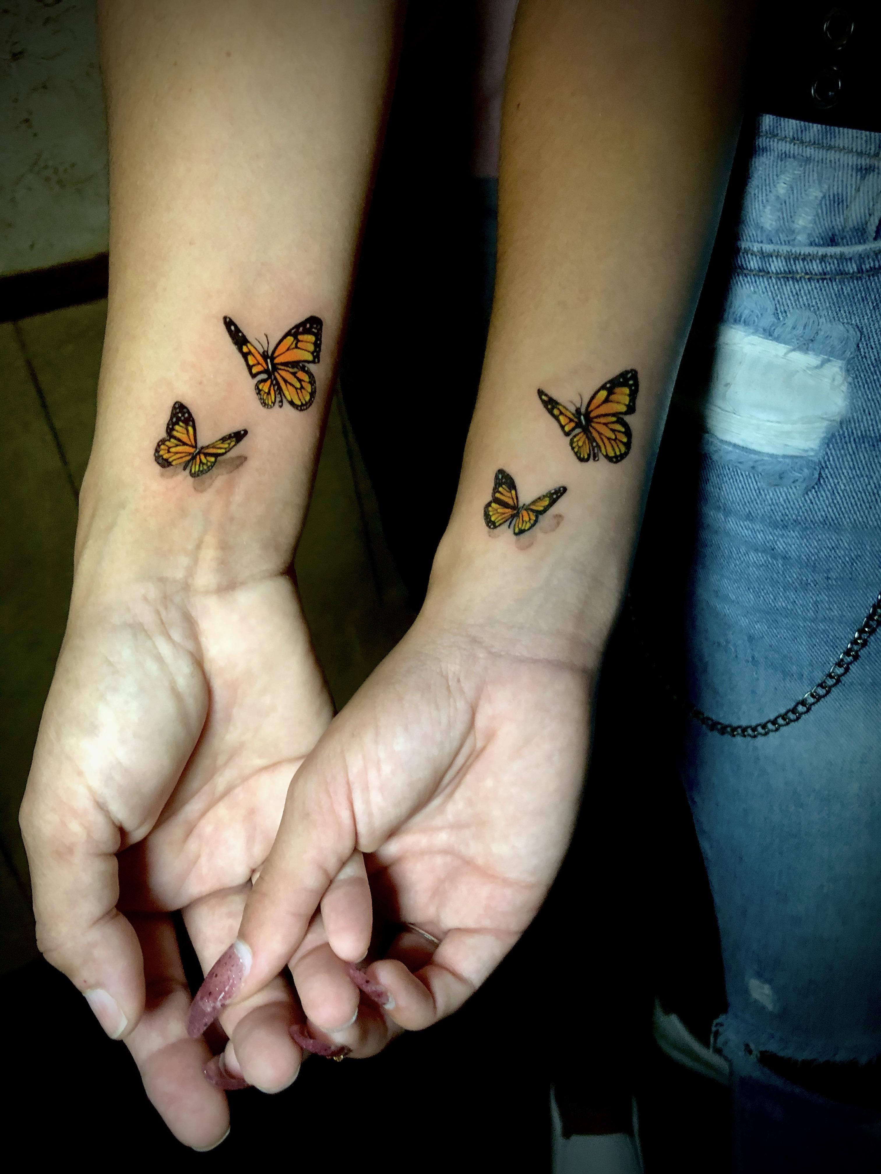 Mom and daughter matching tattoos, by Al at Dark Age Tattoo Studio, Denton, TX | Scrolller