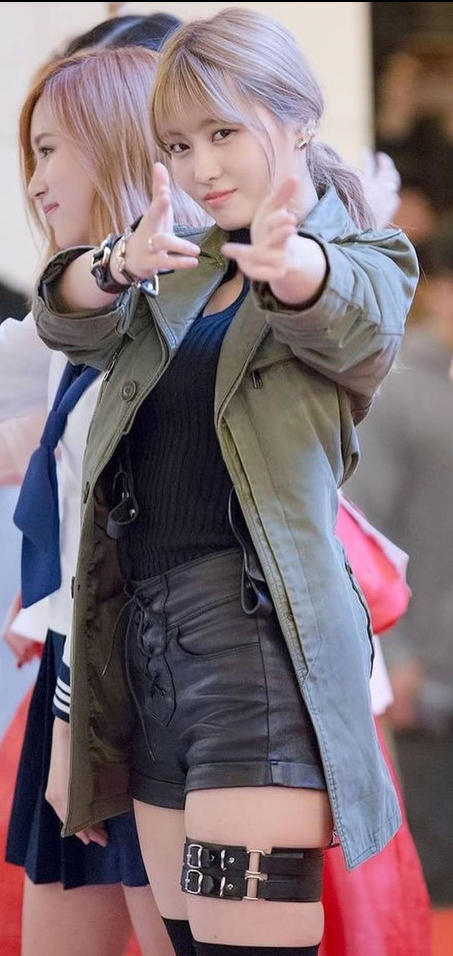 Momo - black shorts & top, green jacket | Scrolller