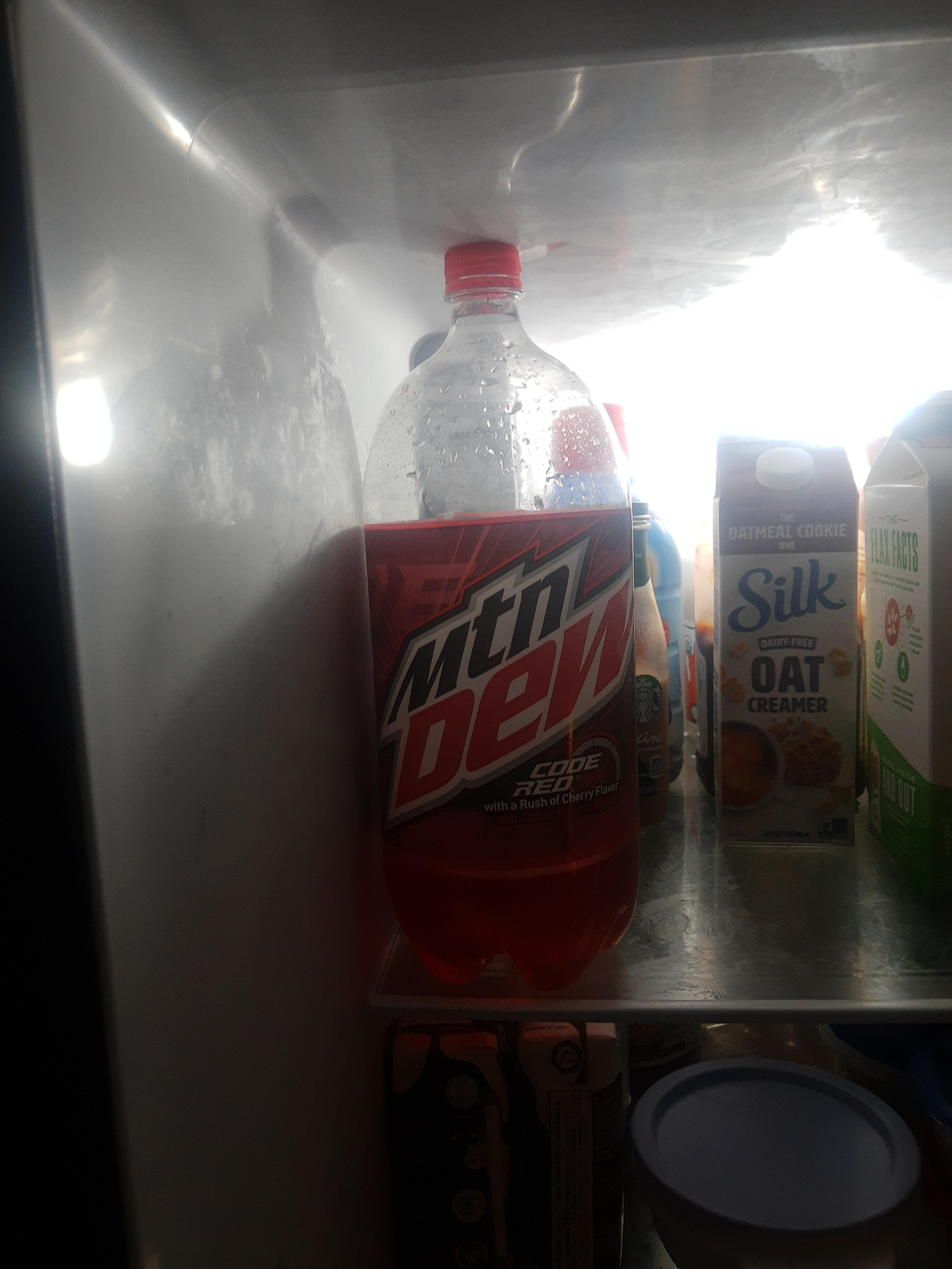 My 2 liter of code red fits perfectly on the top shelf of my fridge | Scrolller