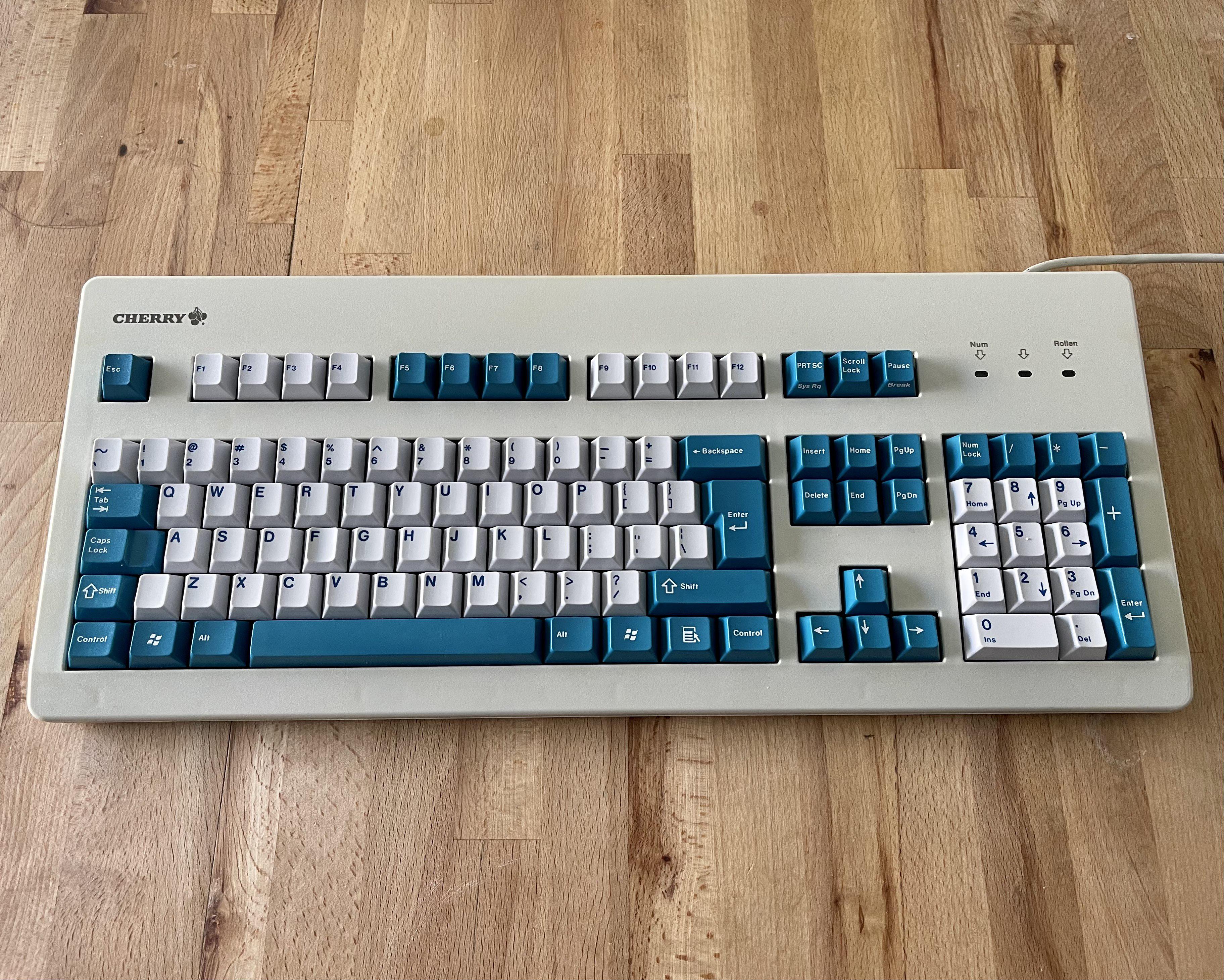 My daily driver, an ISO layout German Cherry G80-3000 w/ MX Clears & a Triumph Adler GMK keyset ...