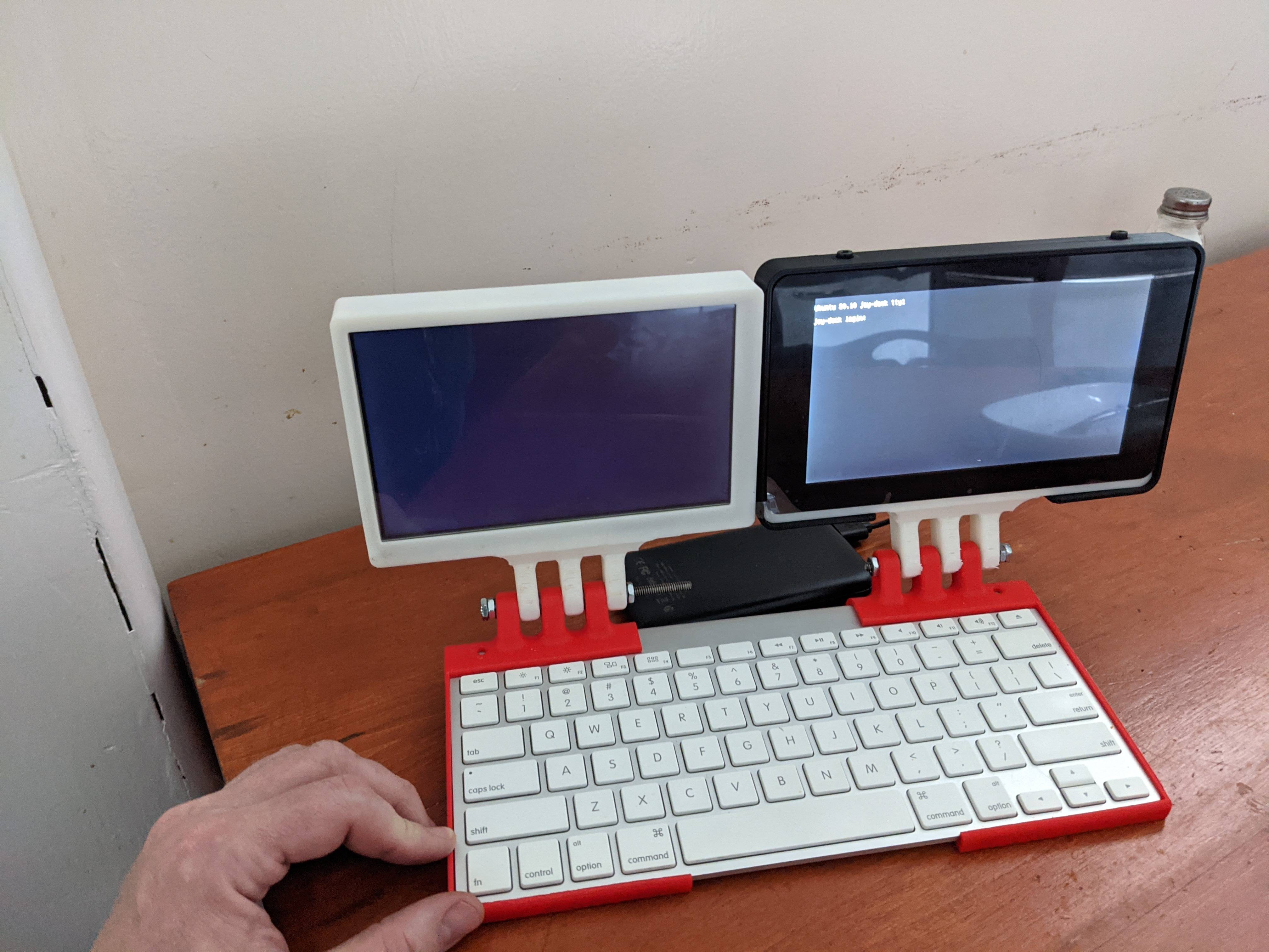 My dual screen raspberry pi deck built in an apple keyboard. V1 | Scrolller