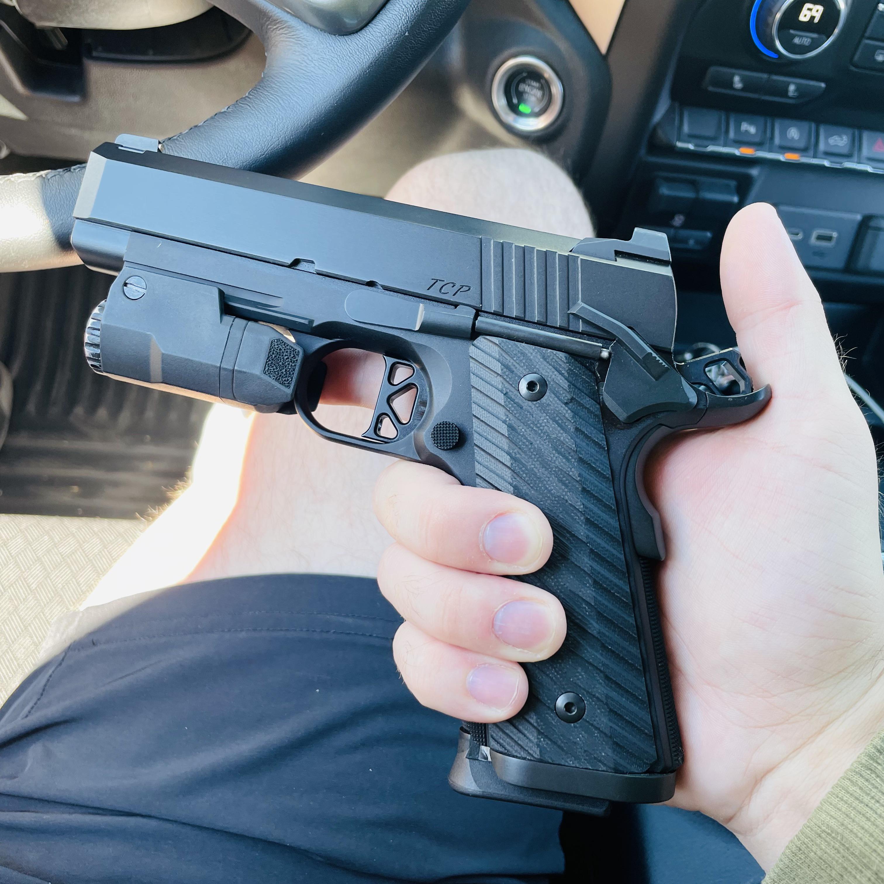 My newest piece - Dan Wesson TCP. Complete with obligatory lap shot. | Scrolller