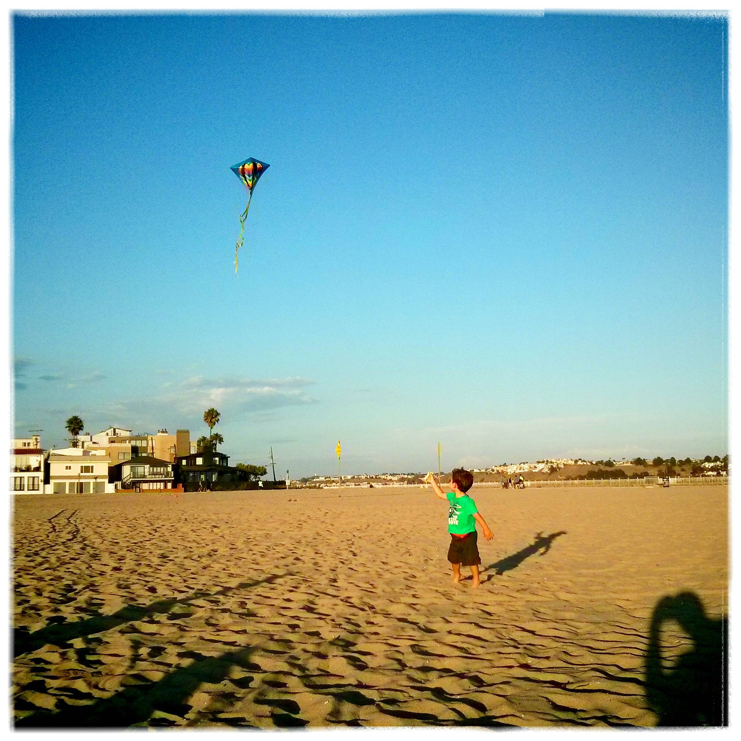 My two year old son flying his first kite. | Scrolller