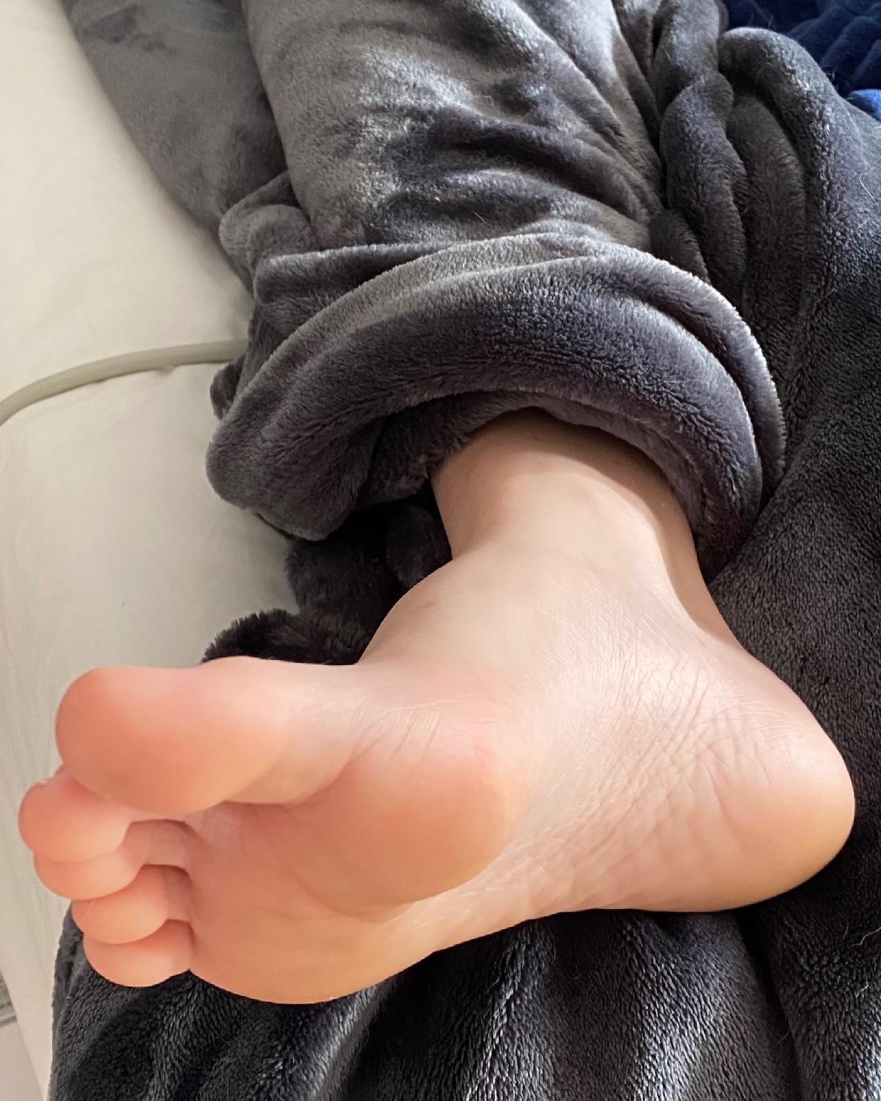My wife’s sleepy foot. Shows off her high arch. | Scrolller
