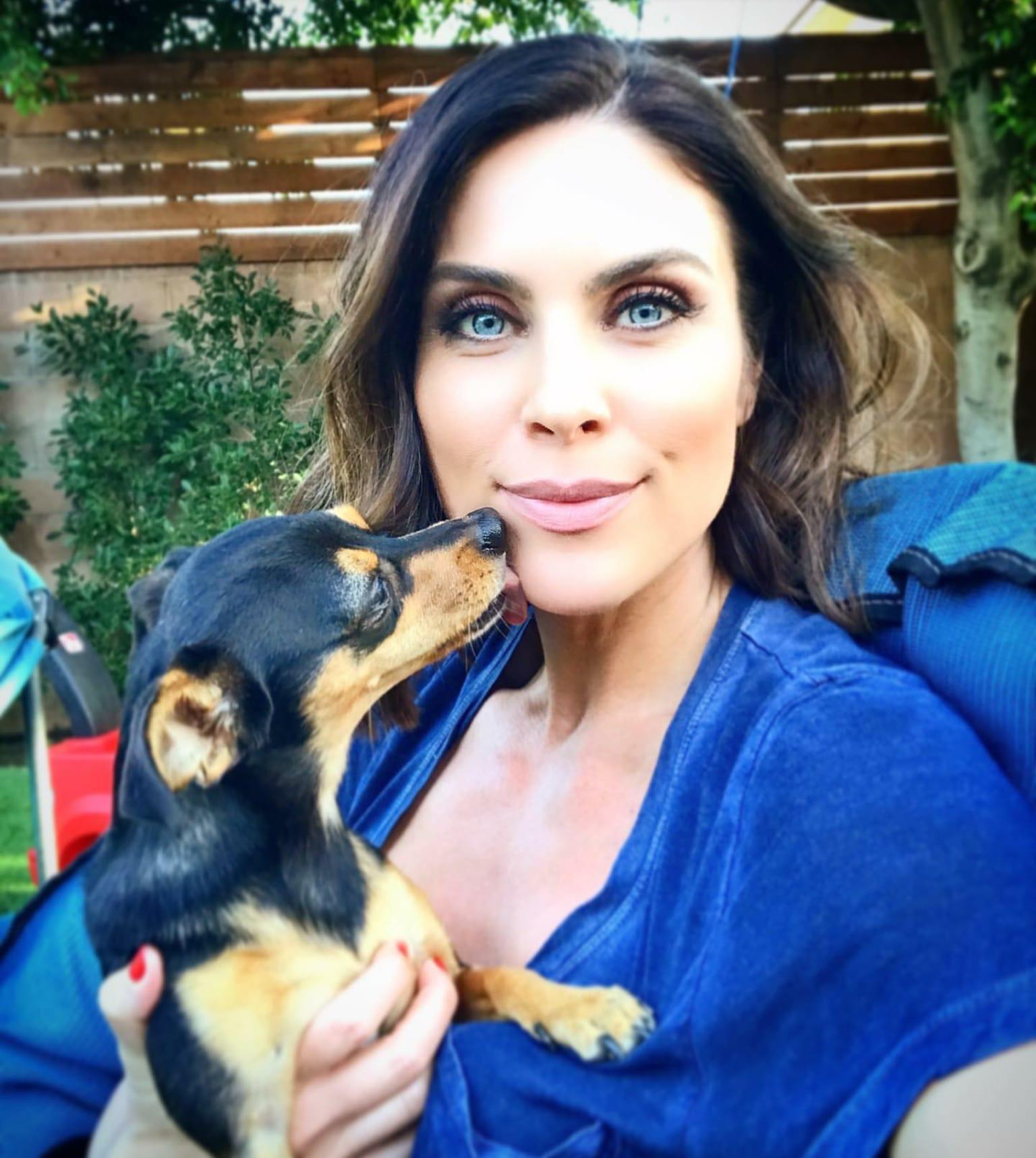 Nadia with her pup | Scrolller