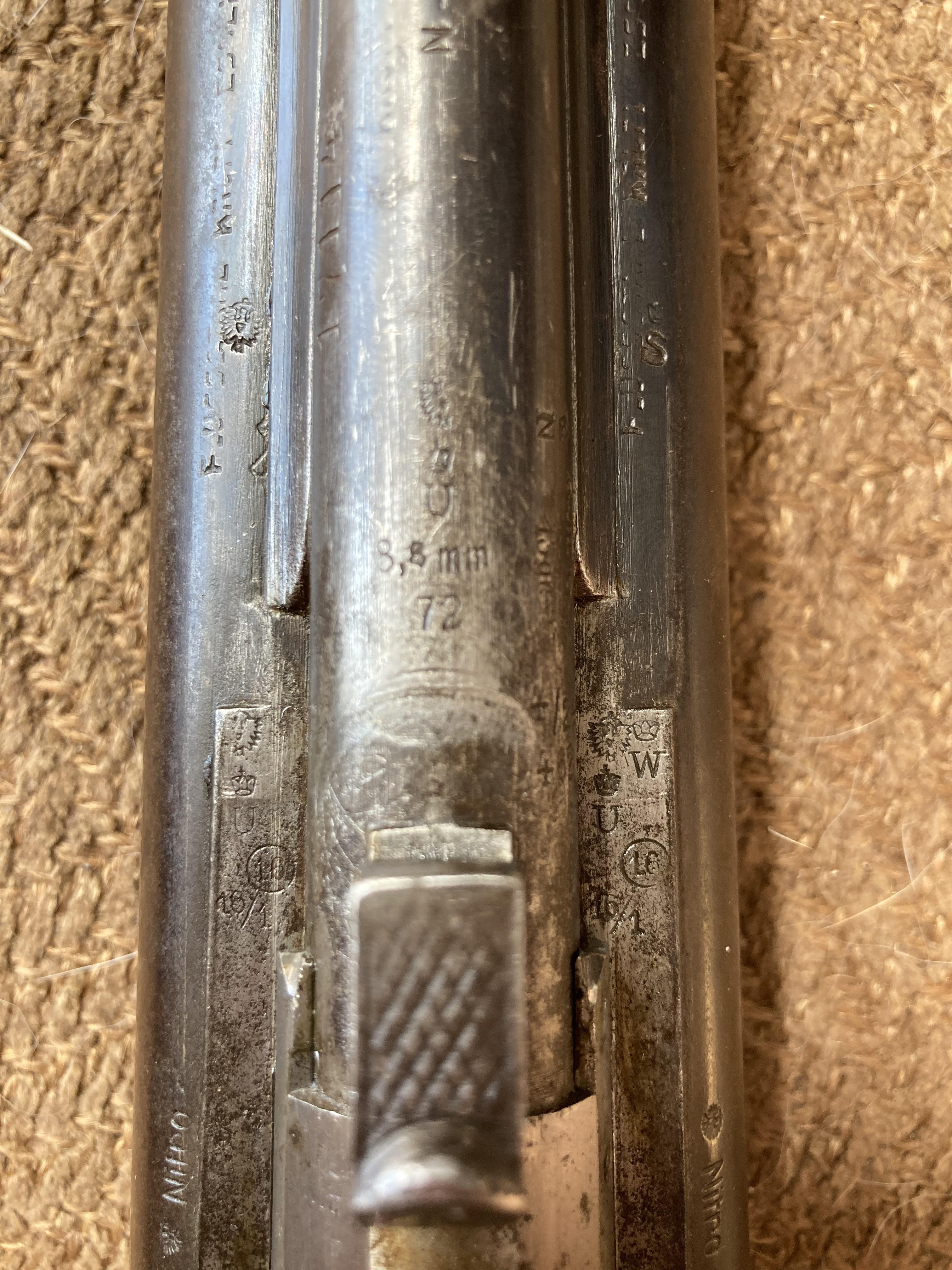 Need help identifying Drilling rifle caliber | Scrolller