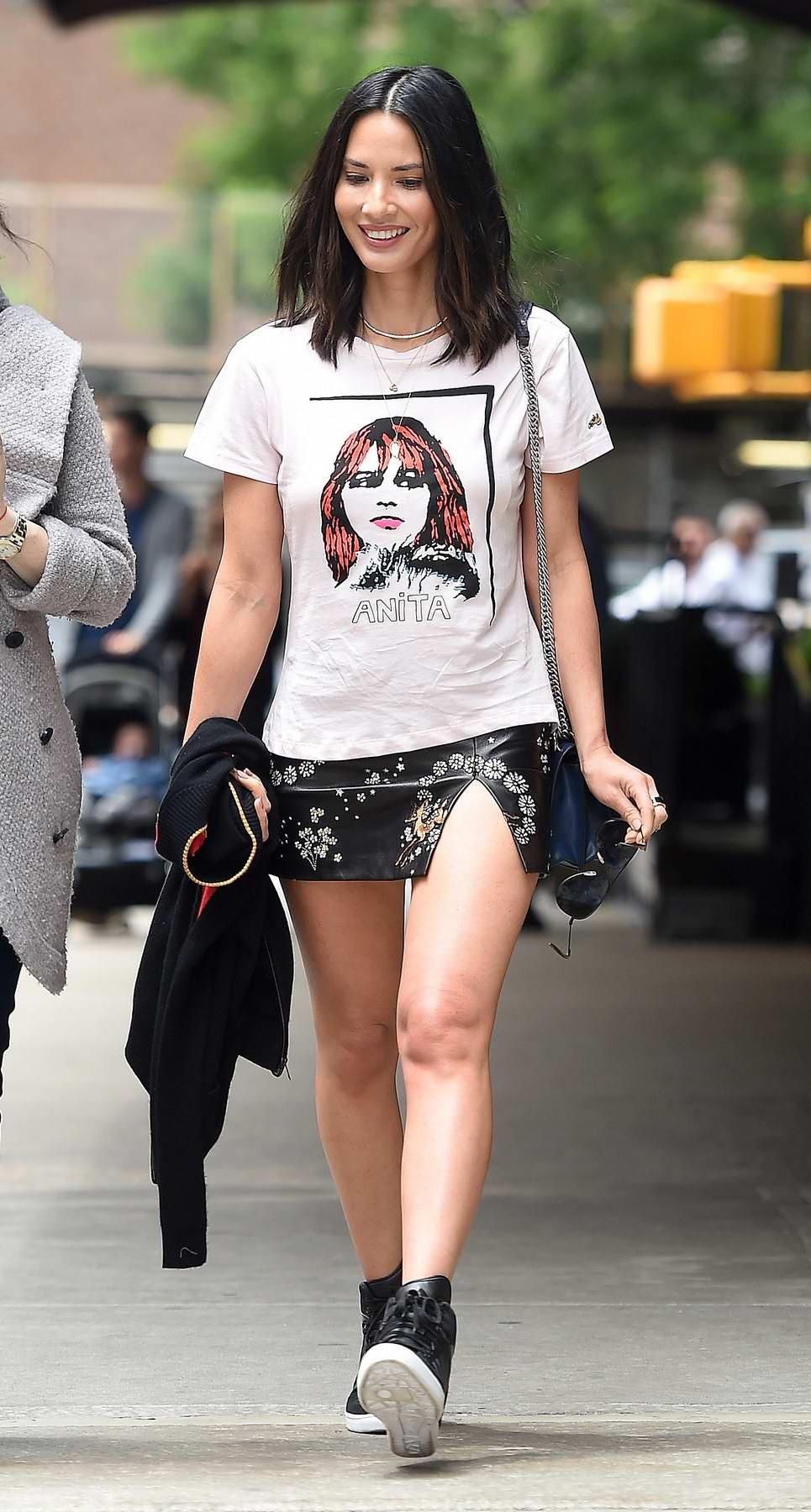 Olivia Munn in barely there mini skirt. | Scrolller