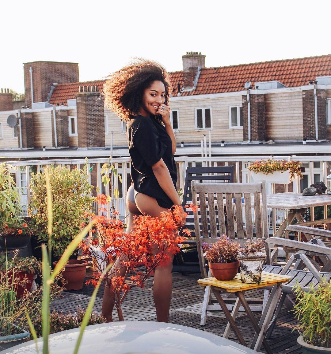 on her balcony | Scrolller