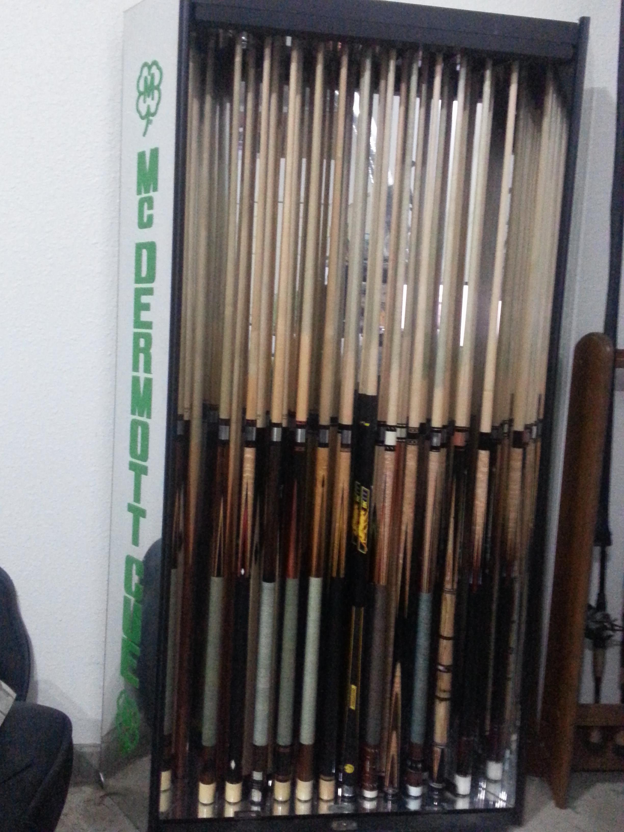 One of my cue racks - With some cues | Scrolller