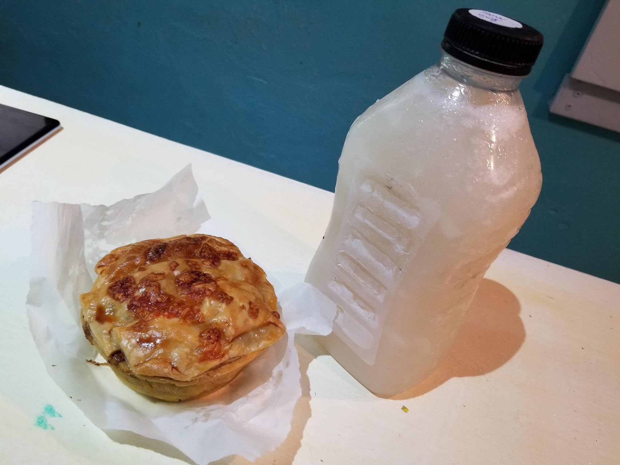 One of Tangi's new meat pies and Soursop juice. | Scrolller