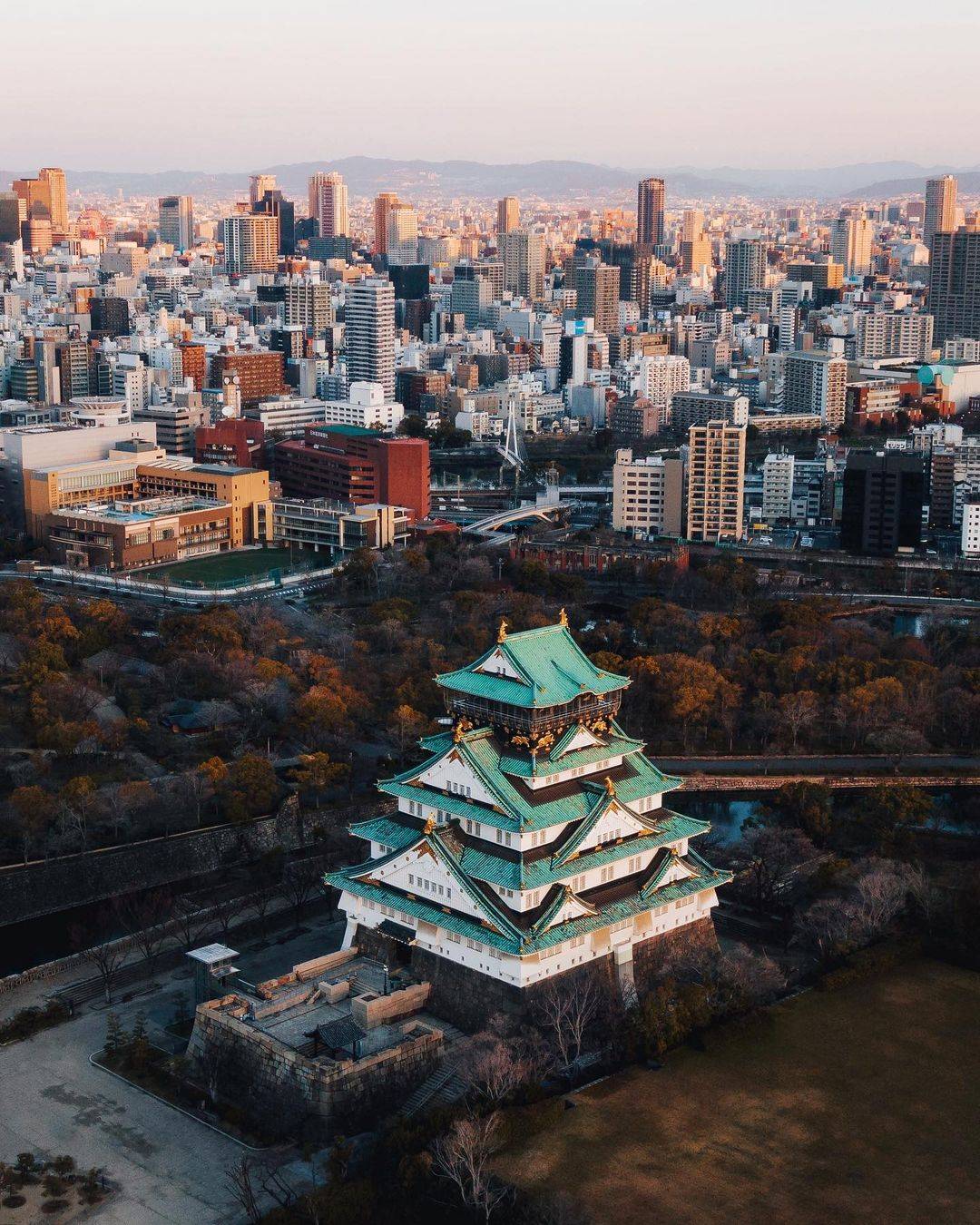 Osaka Castle and Osaka skyline, Japan | Scrolller