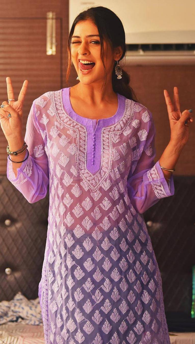 Payal Rajput navel in transparent purple suit | Scrolller